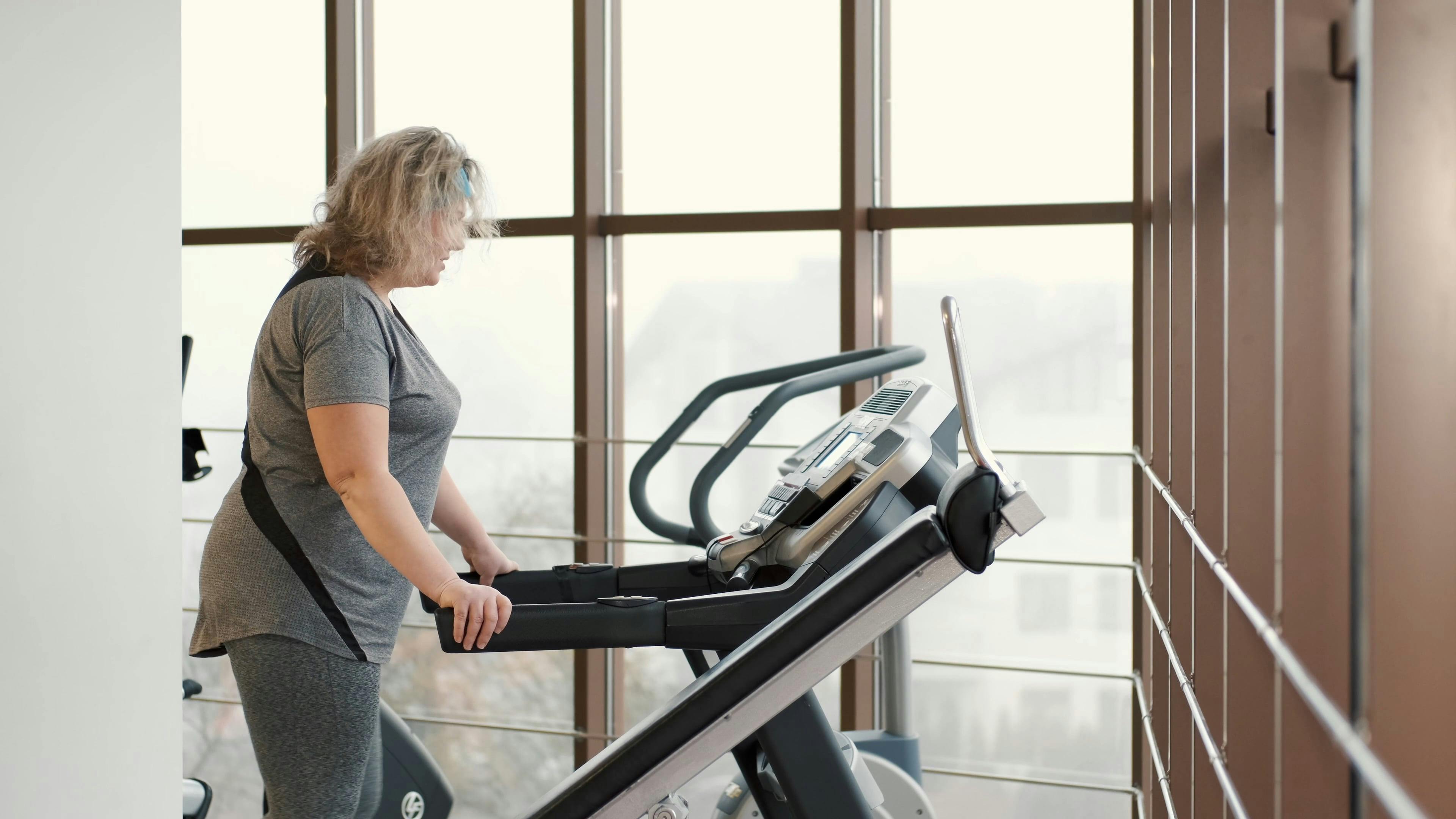 A Woman Exercising on a Thread Mill in the Gym Free Stock Video Footage ...