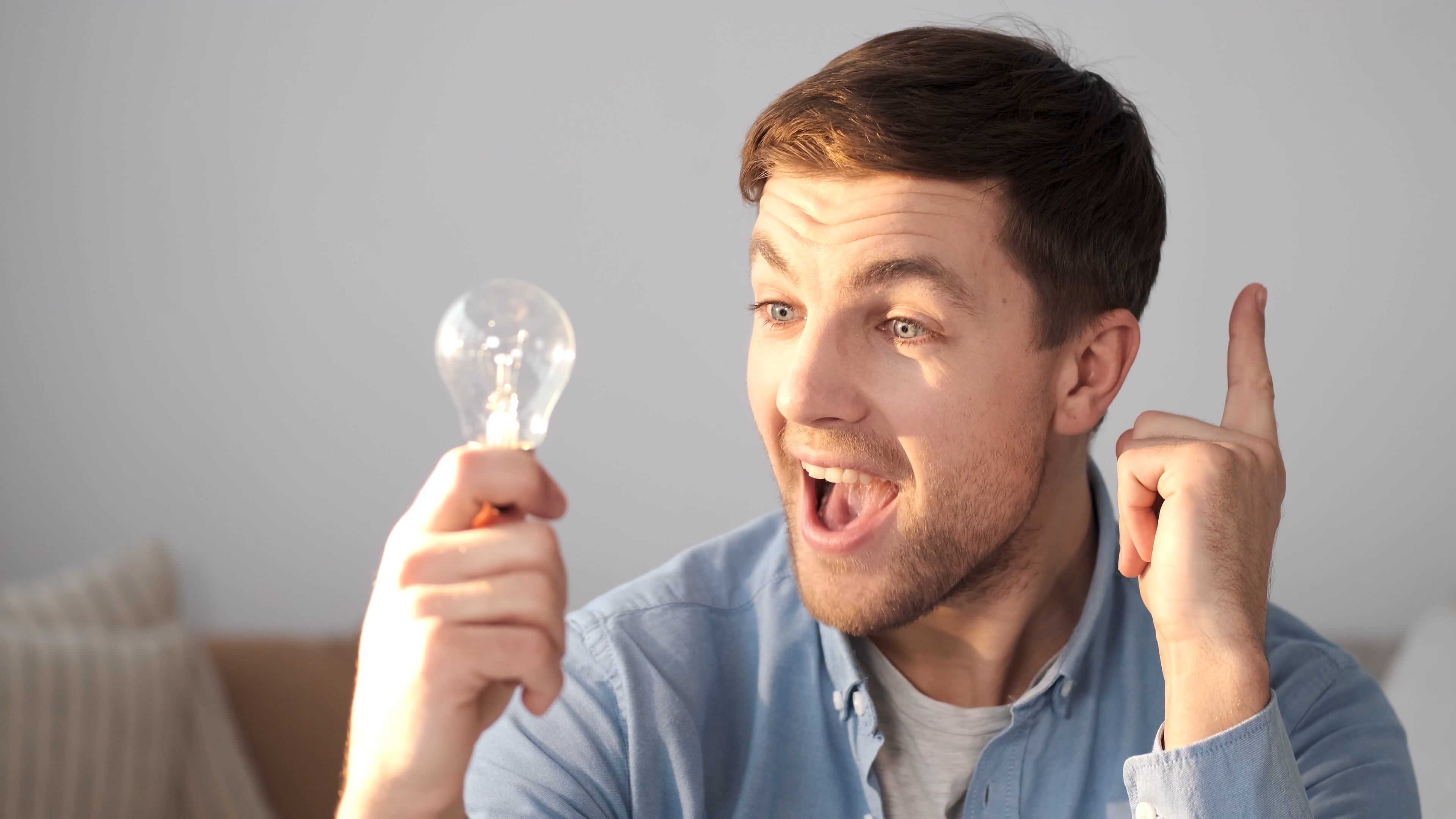 Person Looking to a Light Bulb Free Stock Video Footage, Royalty-Free ...