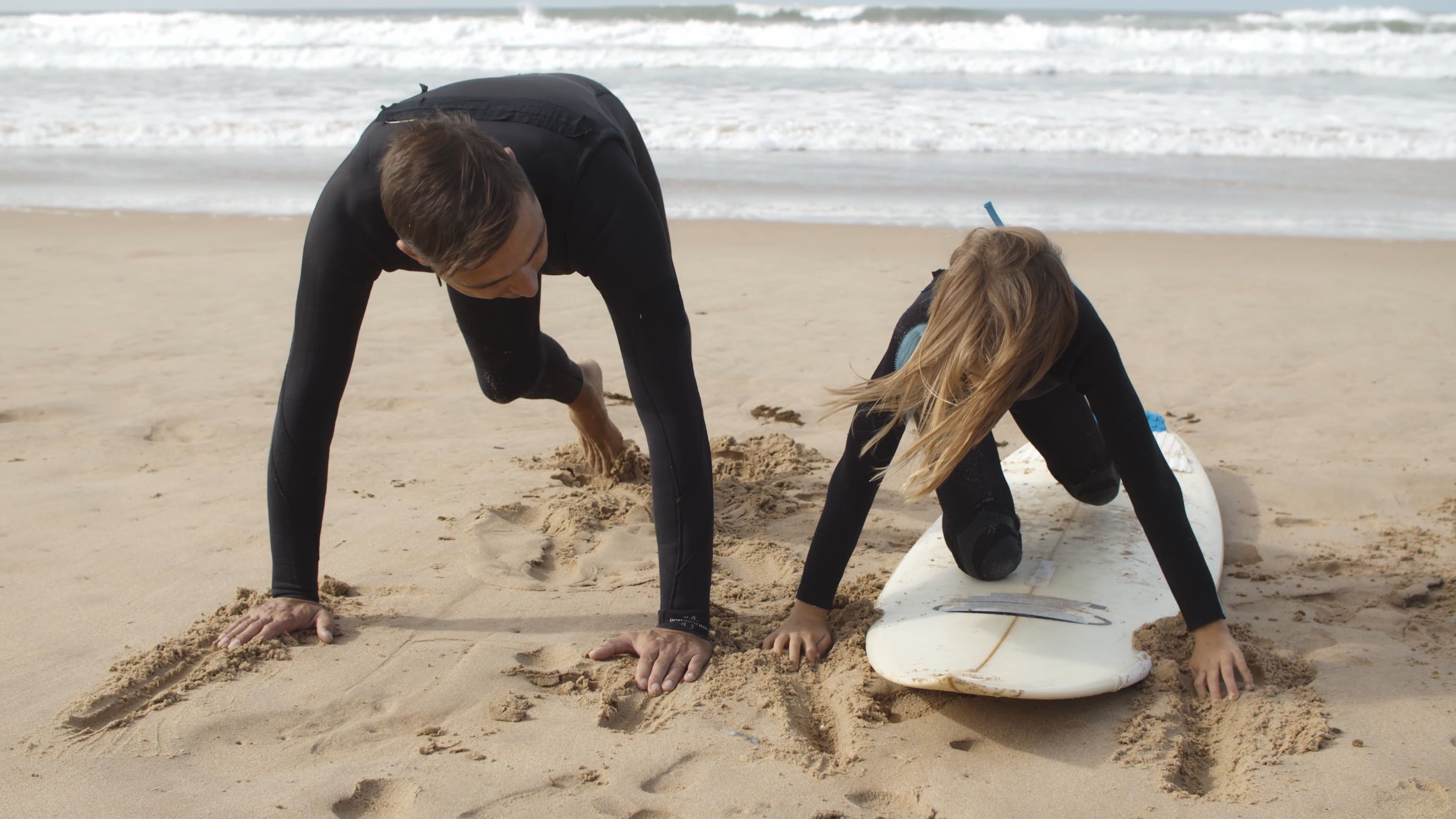 Man Teaching a Girl to Surf Free Stock Video Footage, Royalty-Free 4K ...
