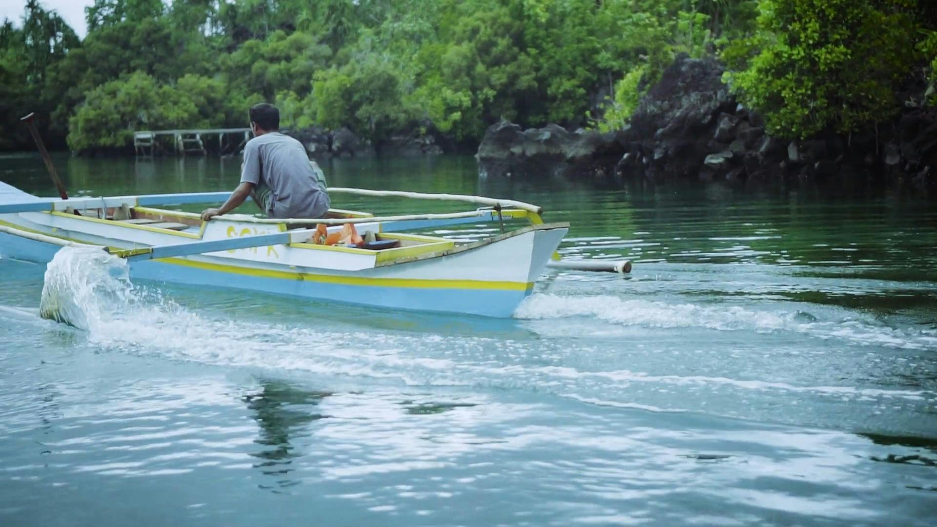 Men Riding on a Wooden Boat while Looking at the Ocean View · Free ...