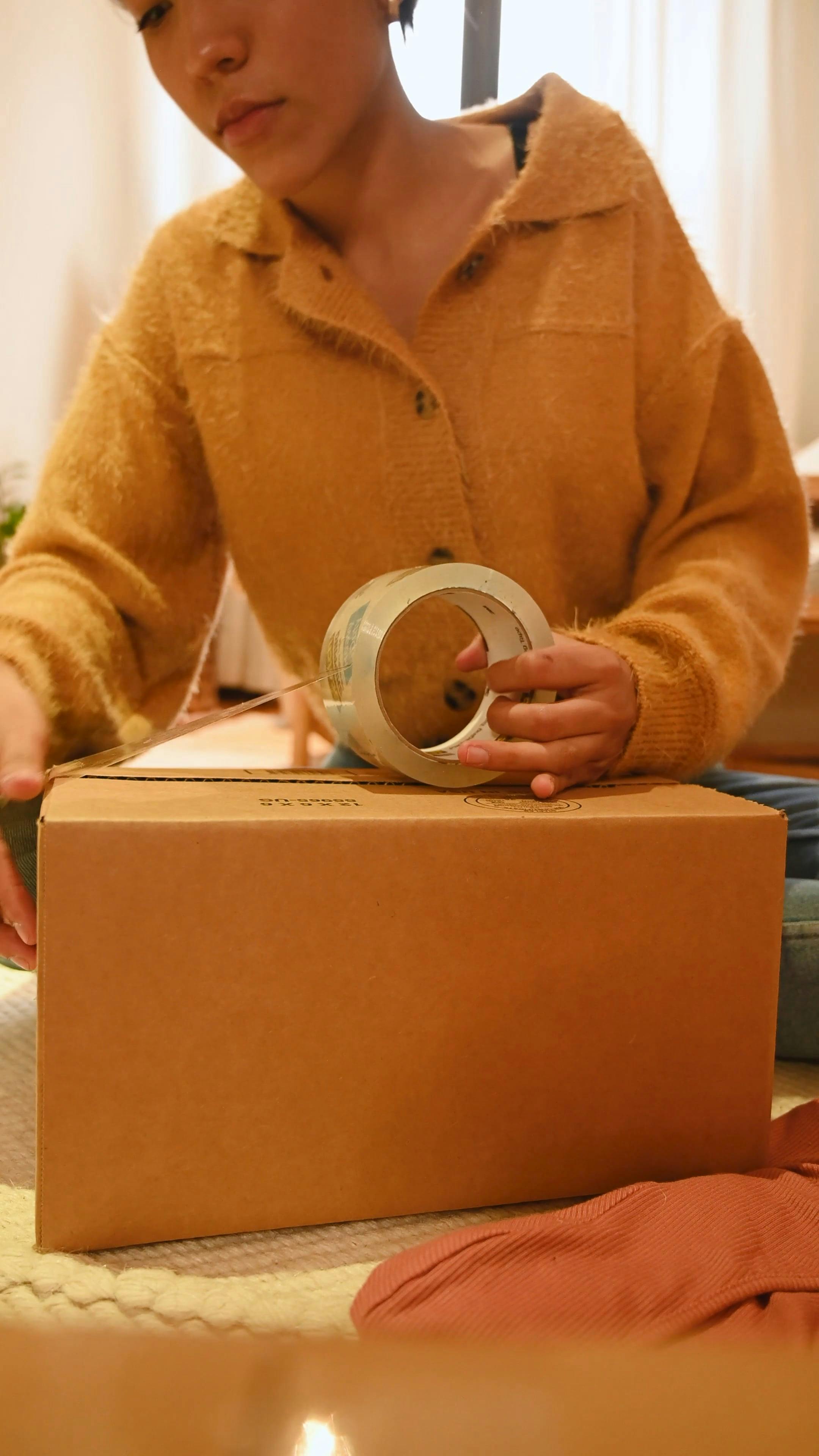 Woman Sealing Box with a Tape Free Stock Video Footage, Royalty-Free 4K ...