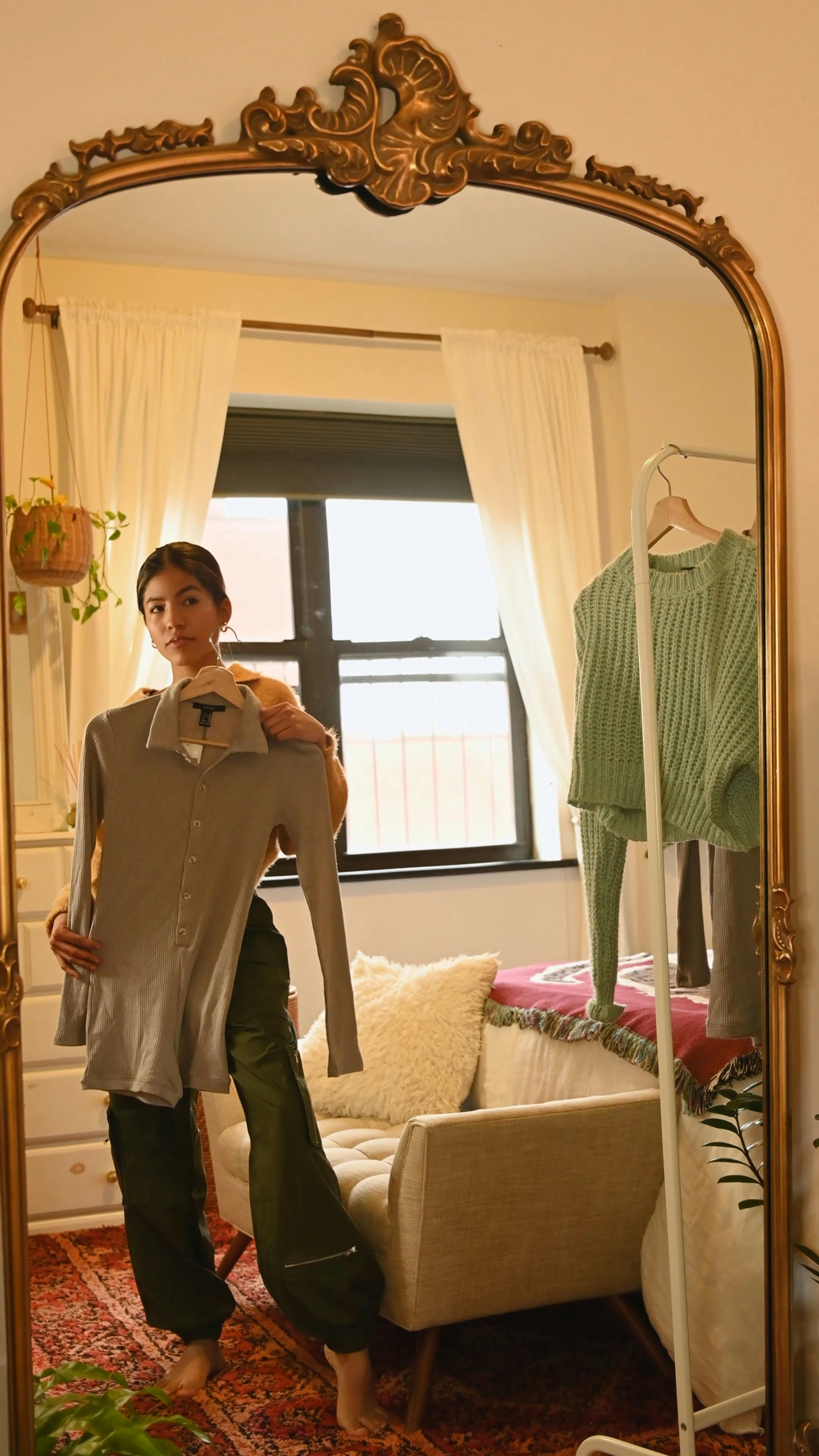 Woman Checking Out New Clothes Looking into Mirror · Free Stock Video