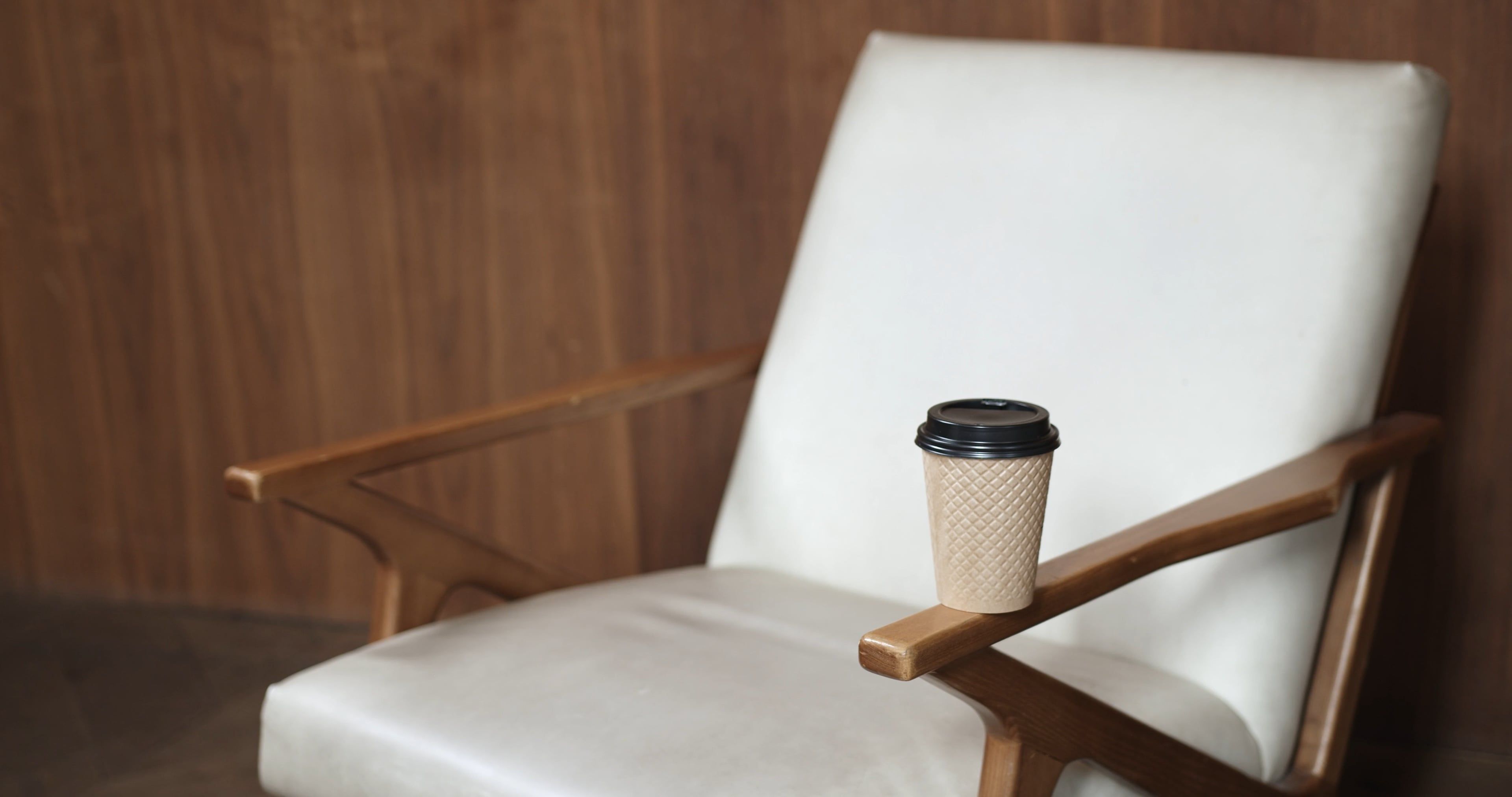 A Cup of Coffee Placed on the Armchair Free Stock Video Footage ...