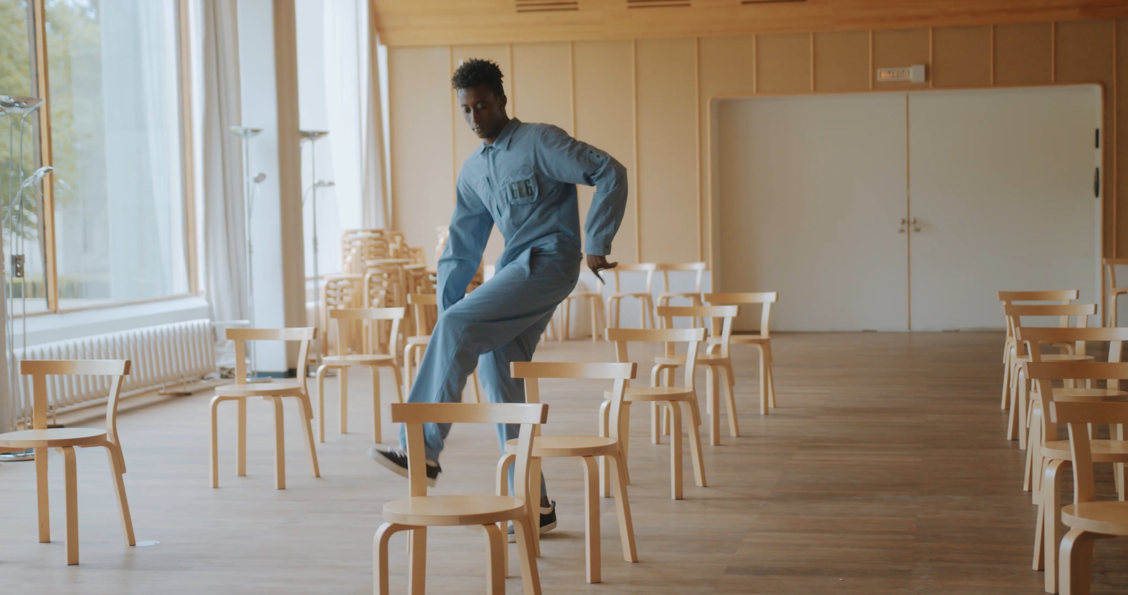 Guy Using Chairs as Prop for his Dance Free Stock Video Footage ...