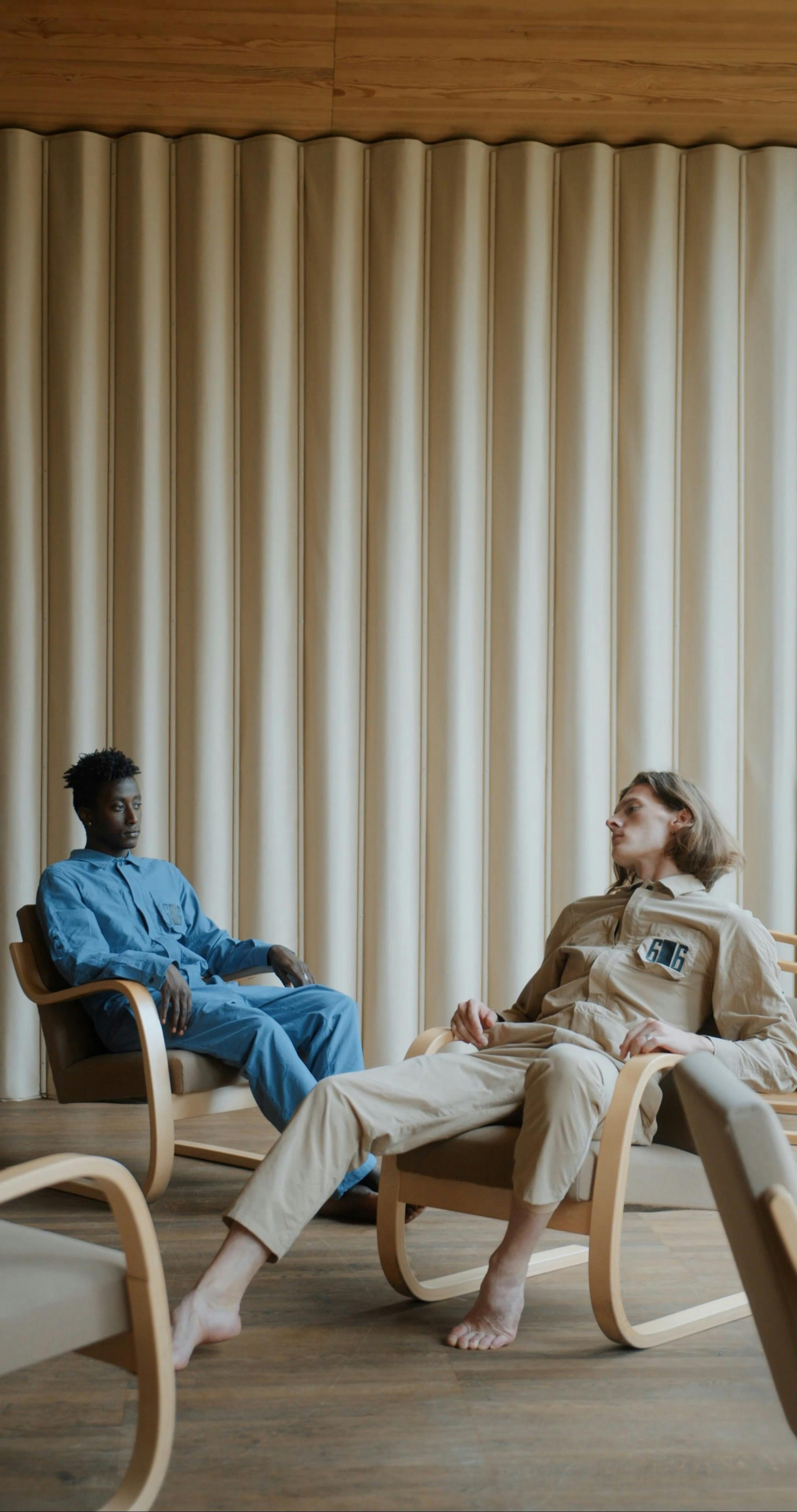 Two Men Sitting on Chairs · Free Stock Video