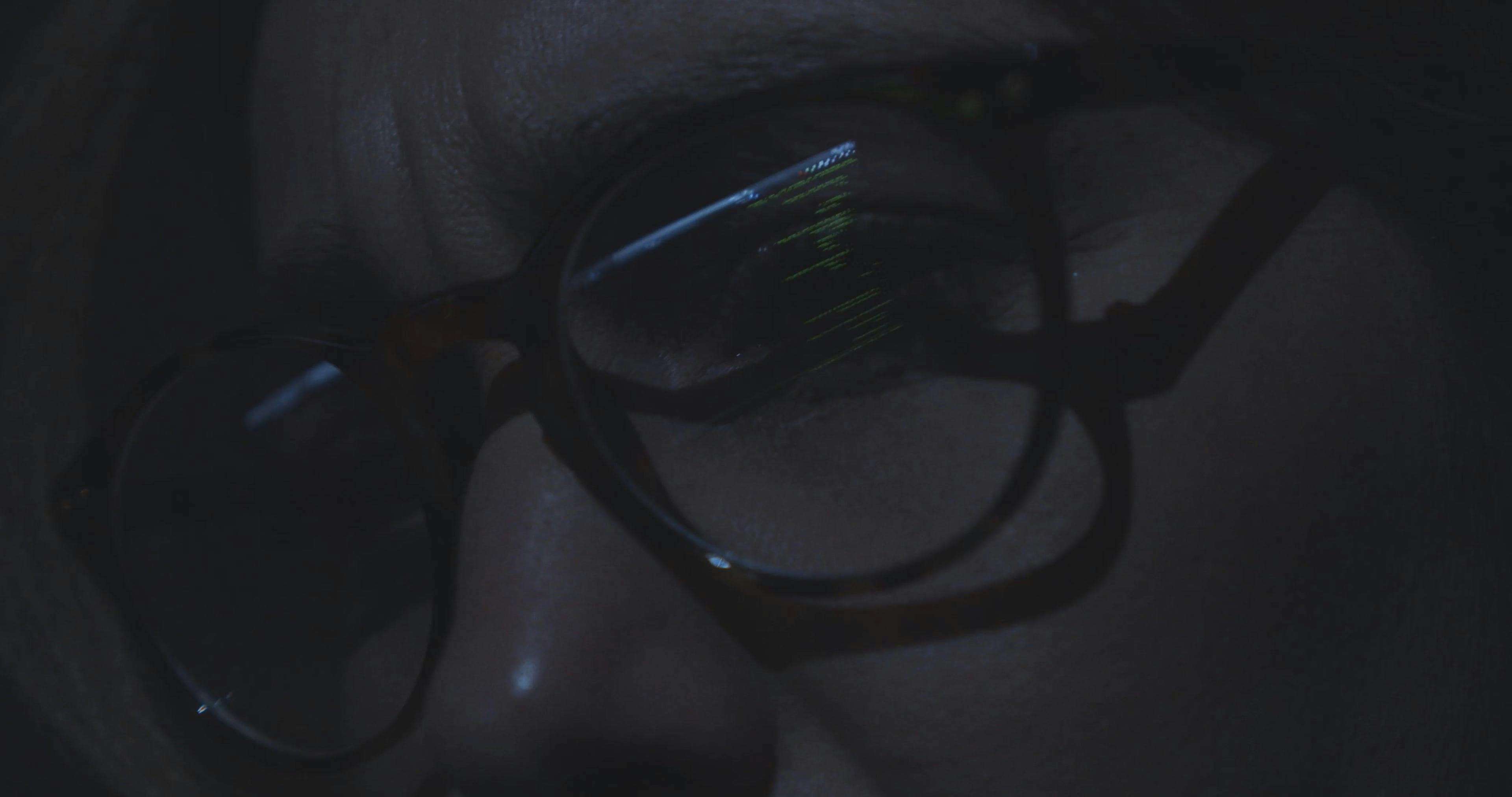 Police Officer Monitoring Security Camera while Looking at the Monitor ...