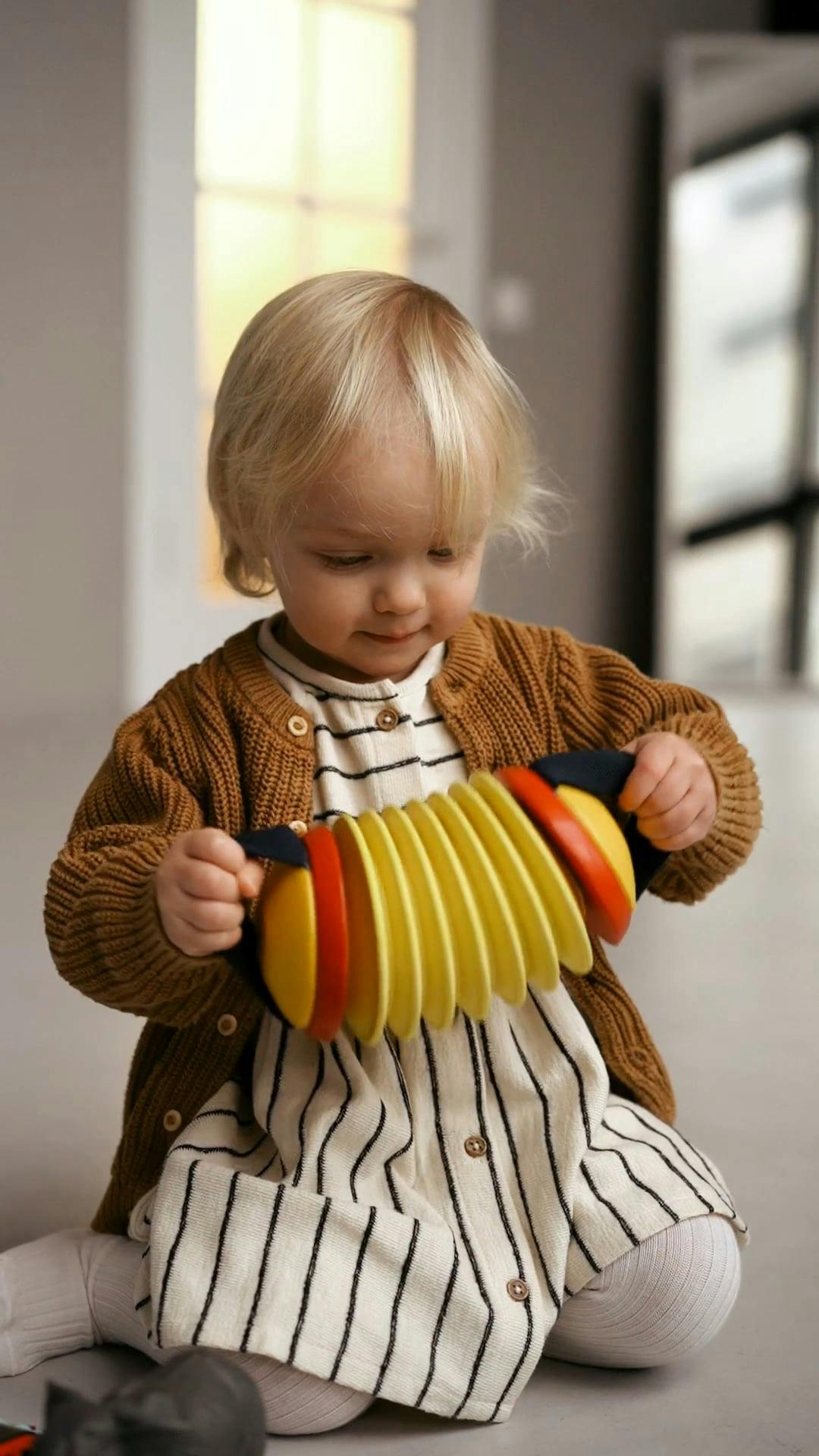 A Toddler Playing A Toy Concertina Free Stock Video Footage, Royalty ...
