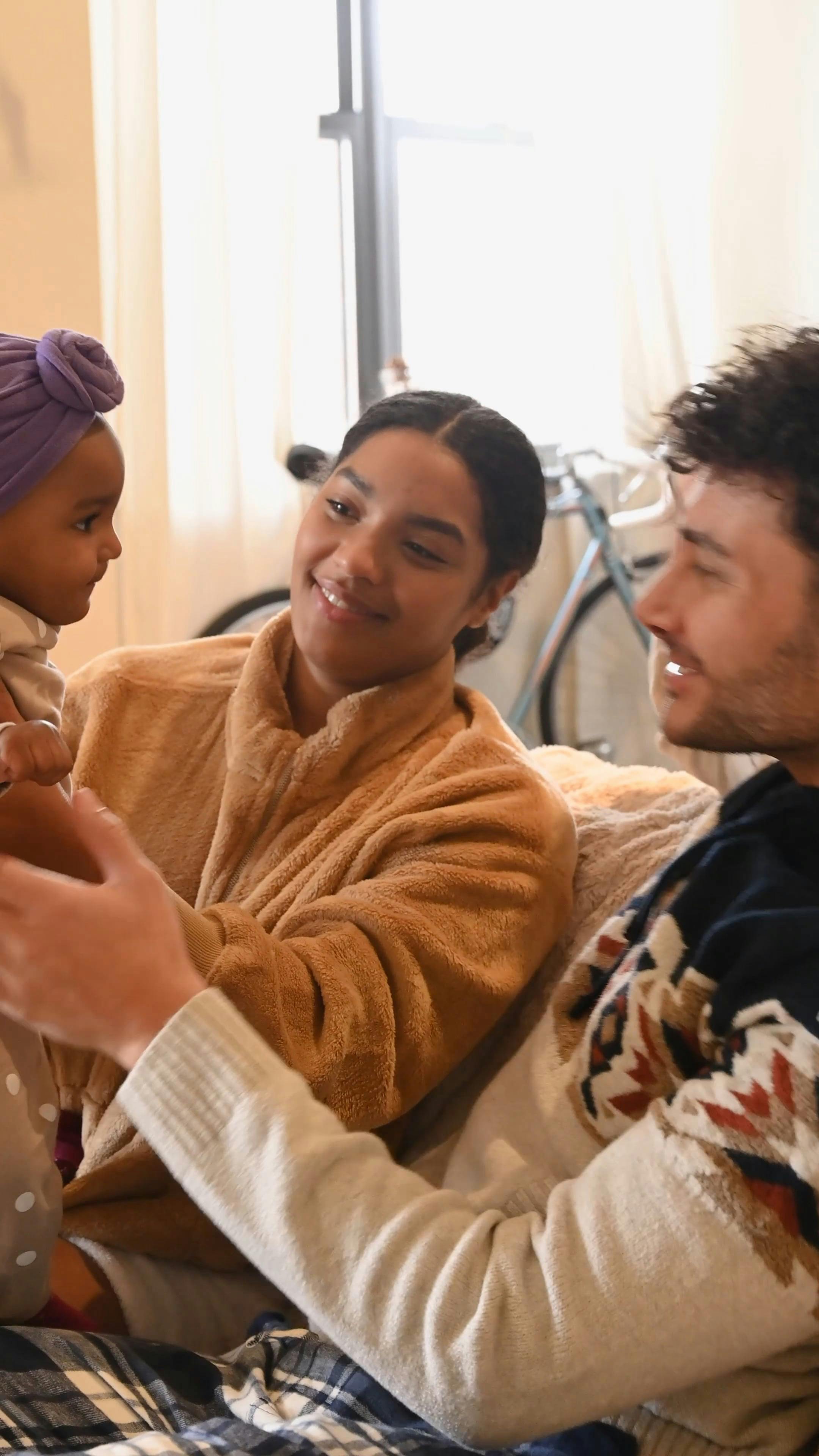 Family Sitting on Sofa · Free Stock Video