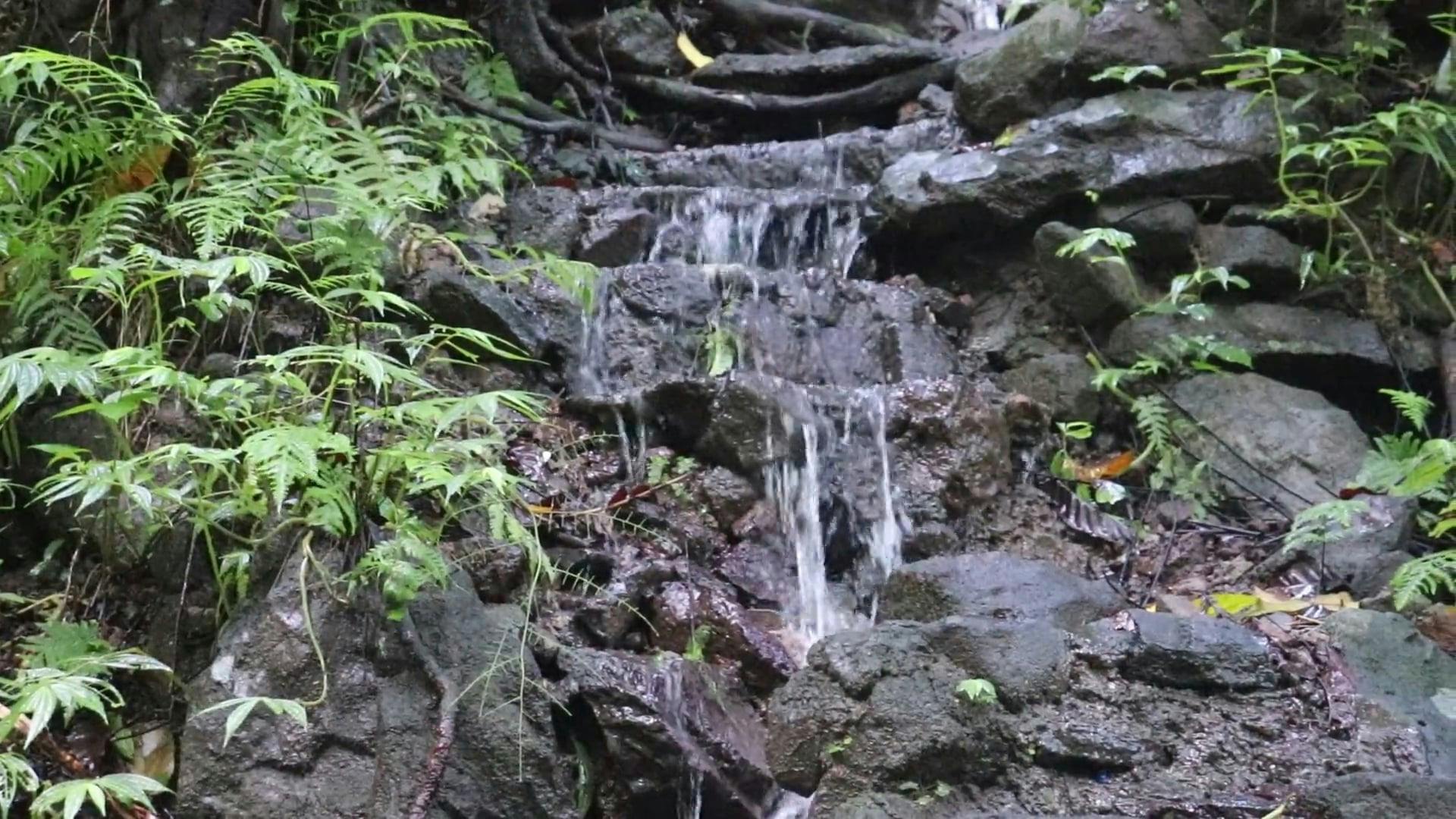 A River Cascading Down Trough Boulder Of Rocks Free Stock Video Footage ...
