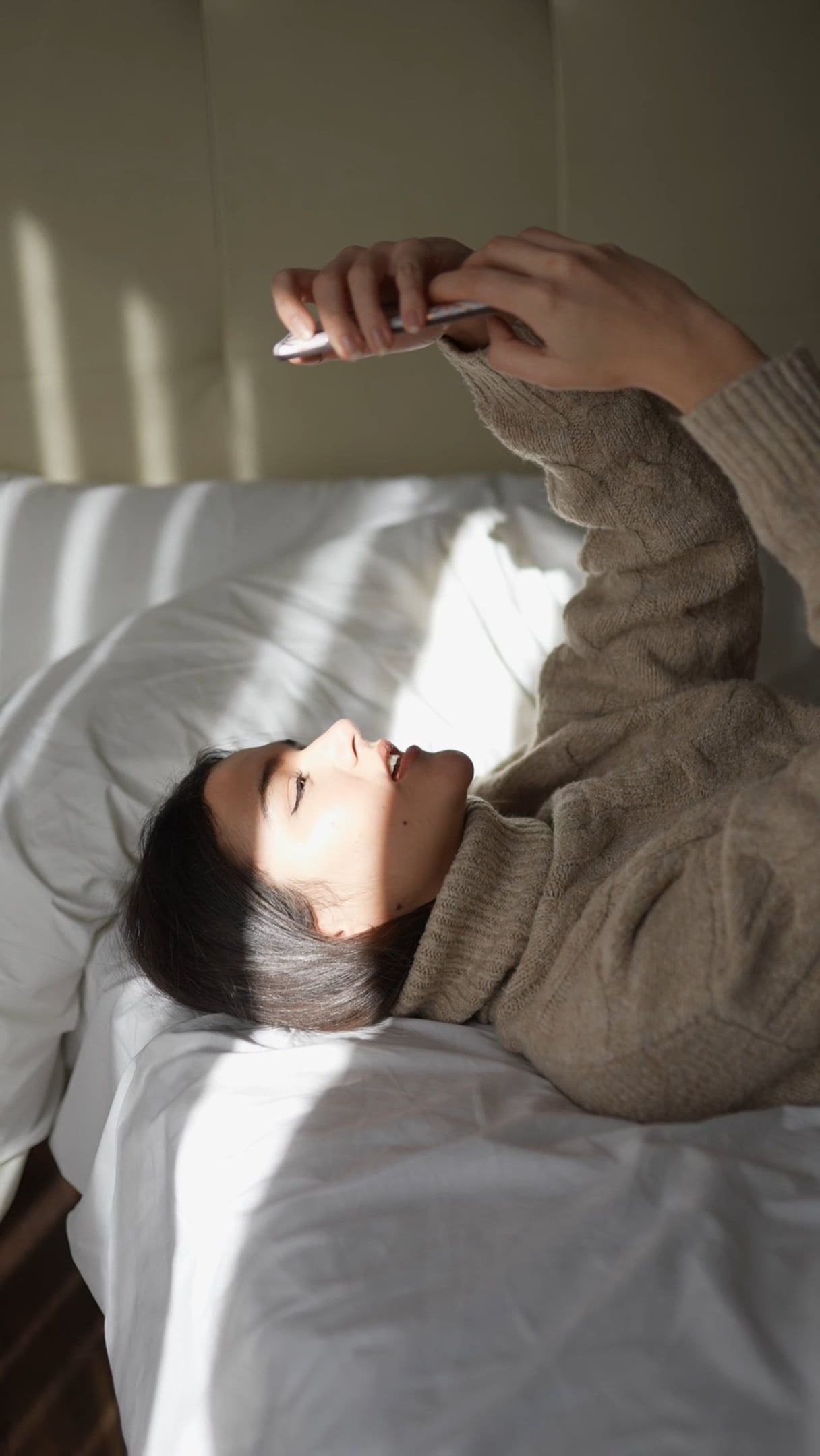 A Woman Lying Down while using a Smartphone Free Stock Video Footage ...
