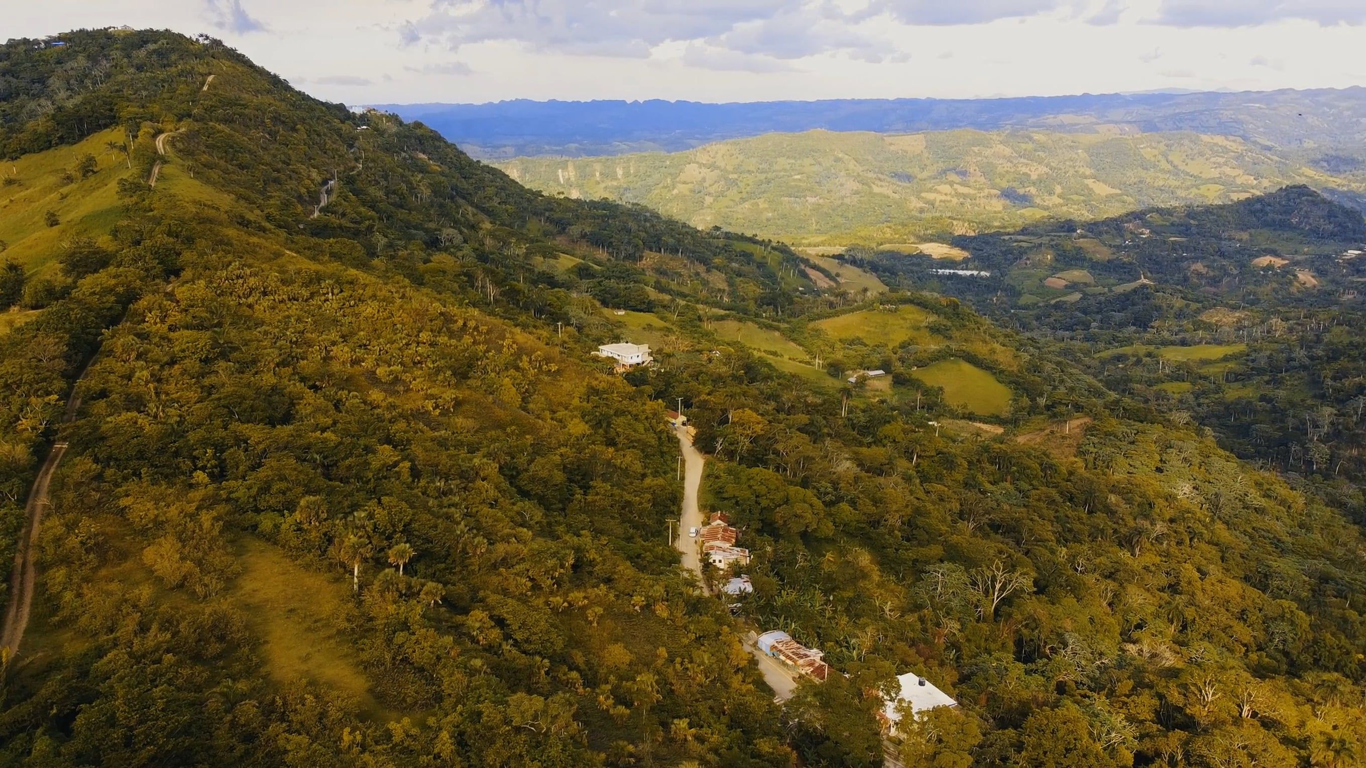 Aerial Footage Of A Canal Along A Mountain Island With Lush Vegetation ...