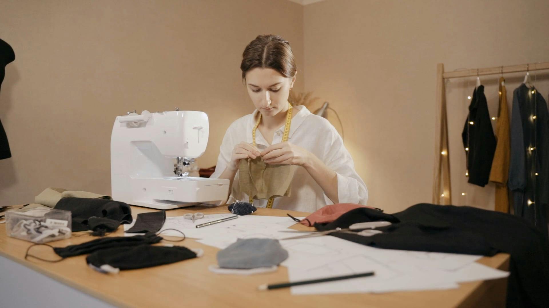 A Woman Stitching a Fabric Free Stock Video Footage, Royalty-Free 4K ...