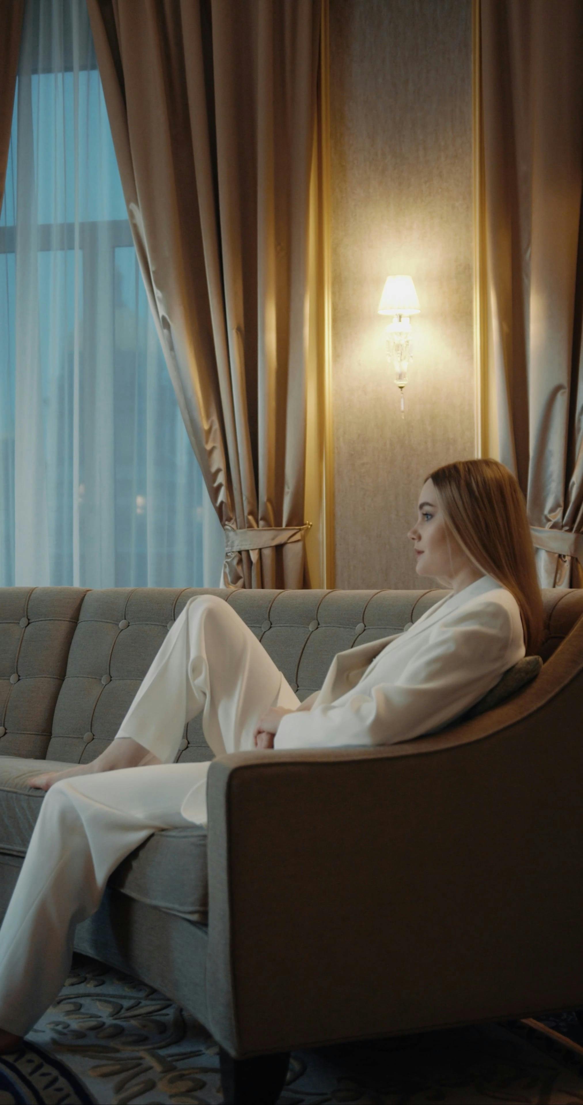 Elegant Woman Modeling In The Sofa · Free Stock Video