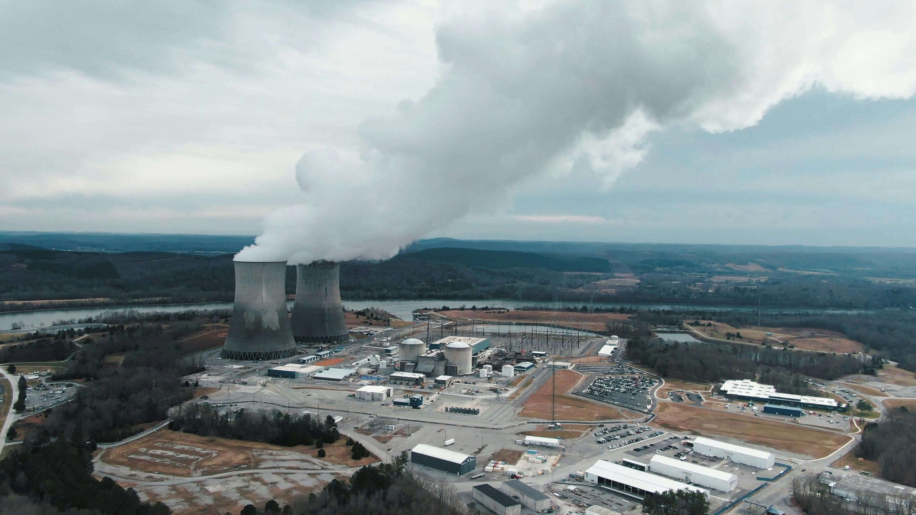 Footage Of Power Plant Beside A River · Free Stock Video