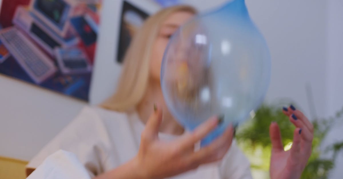 Young Woman Playing With Condom Balloon Free Stock Video Footage
