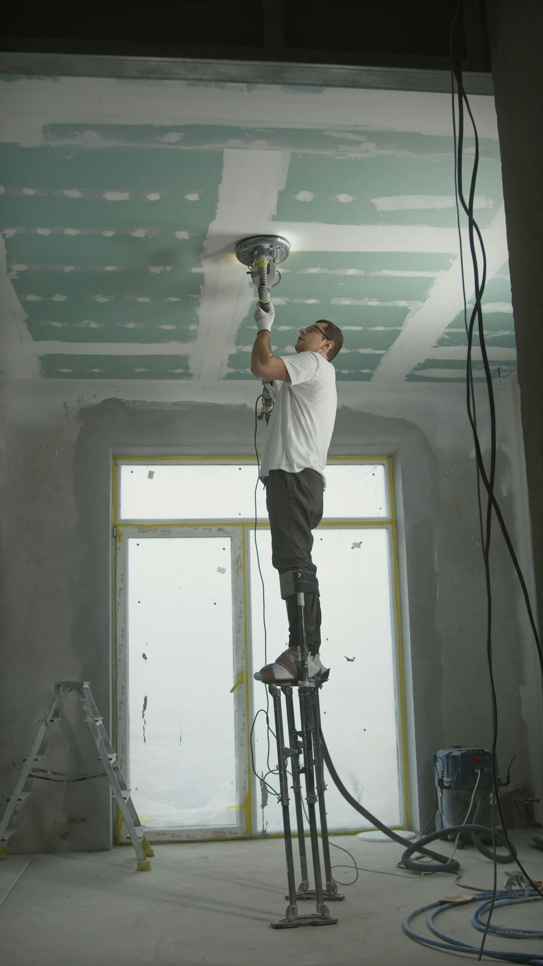 A Man Working On A Ceiling · Free Stock Video