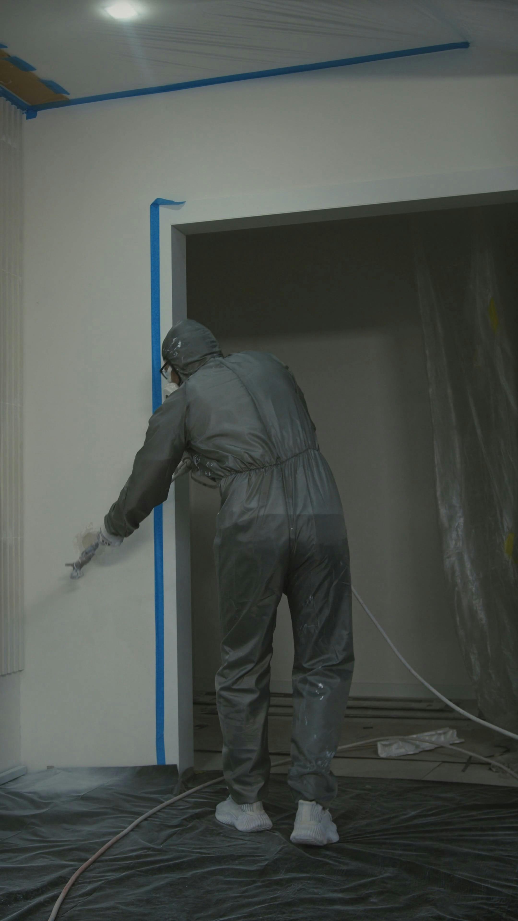 Person Painting a Wall · Free Stock Video