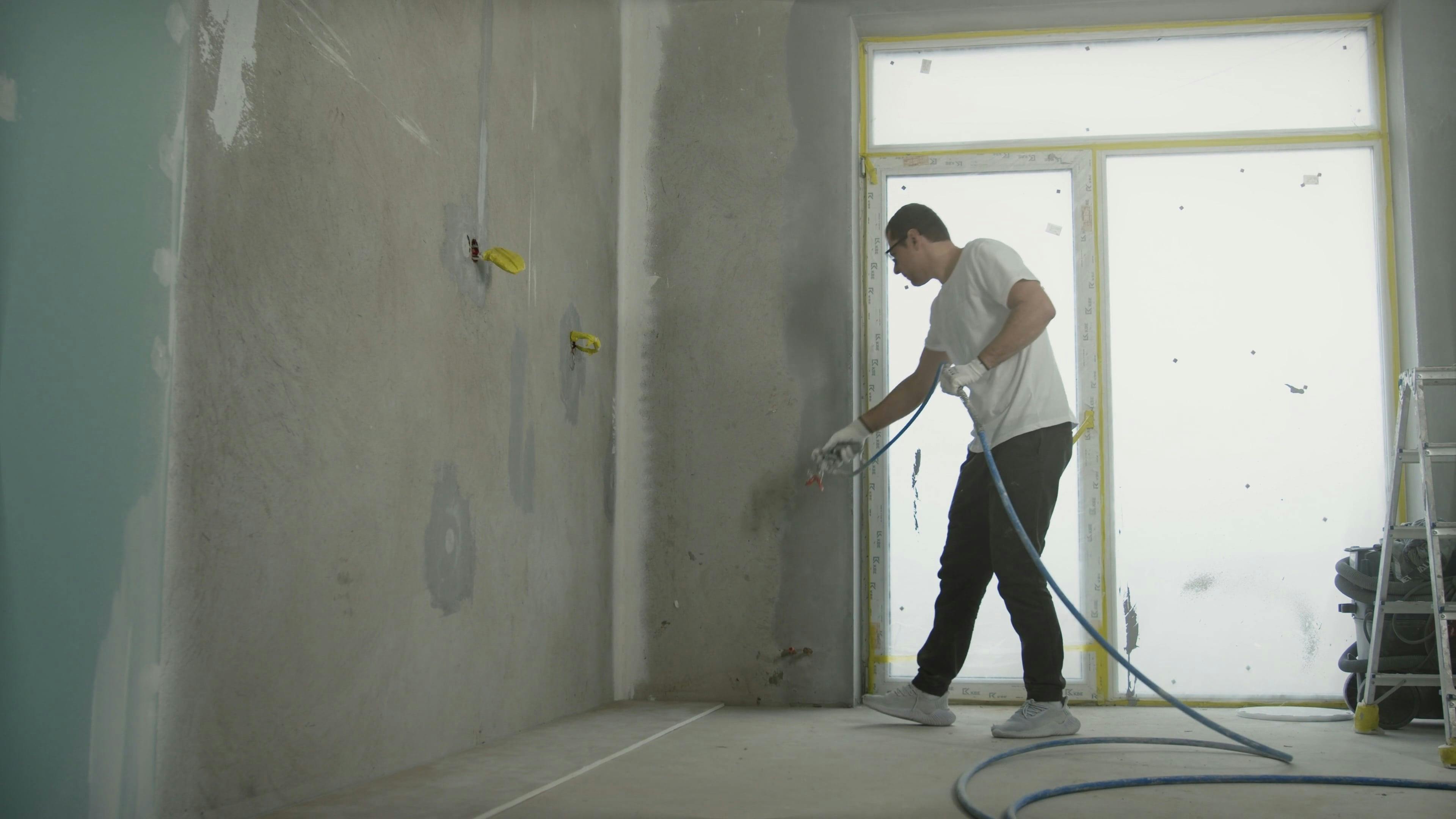 Man Painting the Wall · Free Stock Video
