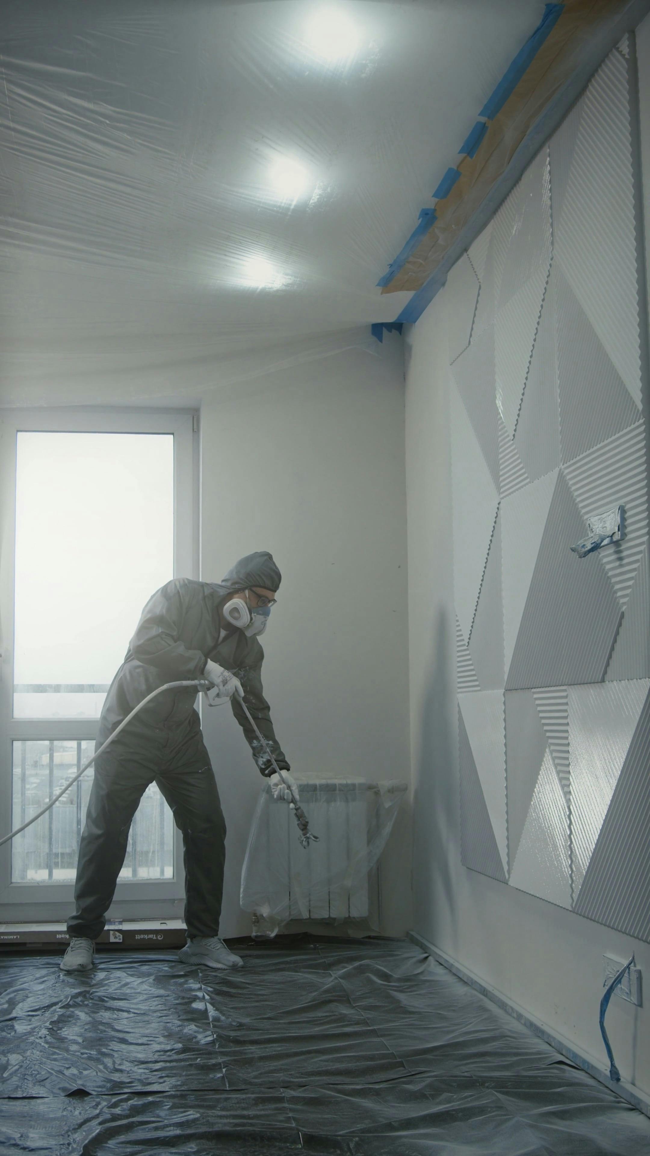 Person Painting a Wall · Free Stock Video