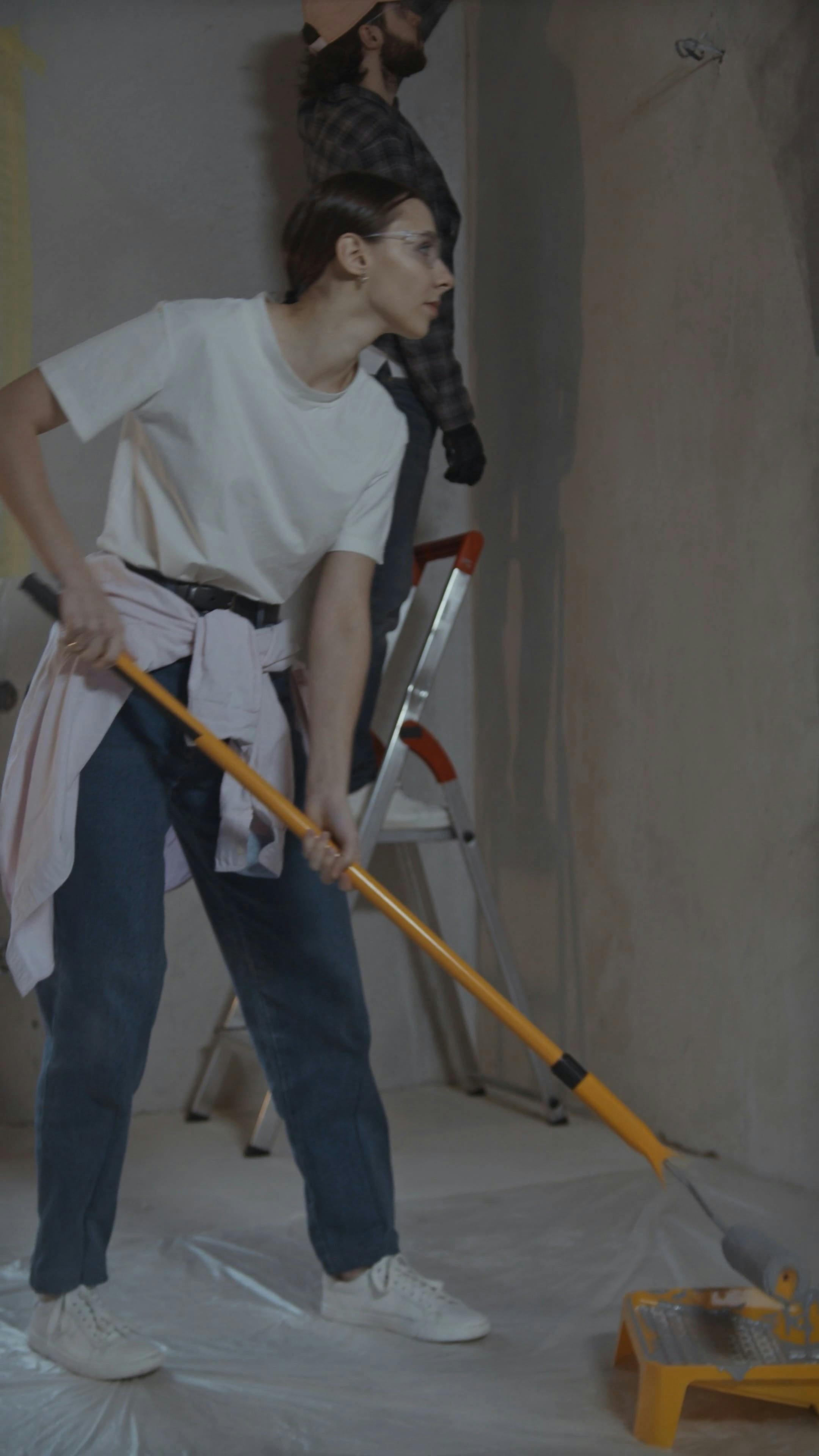 Person Painting a Wall · Free Stock Video