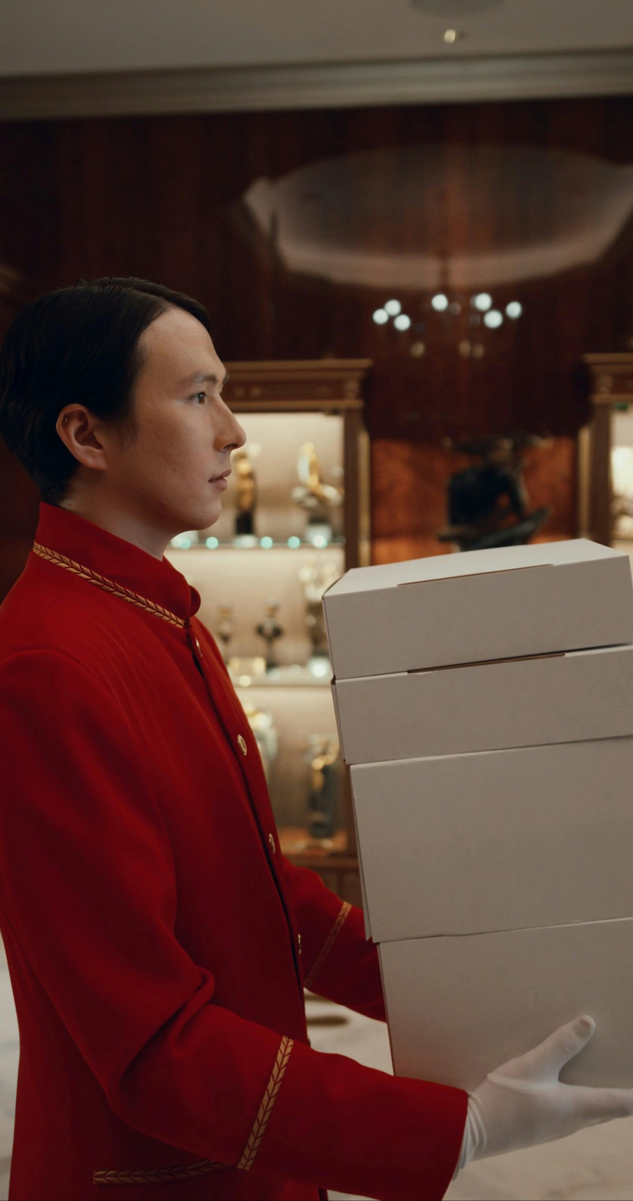 Concierge Carrying White Boxes · Free Stock Video