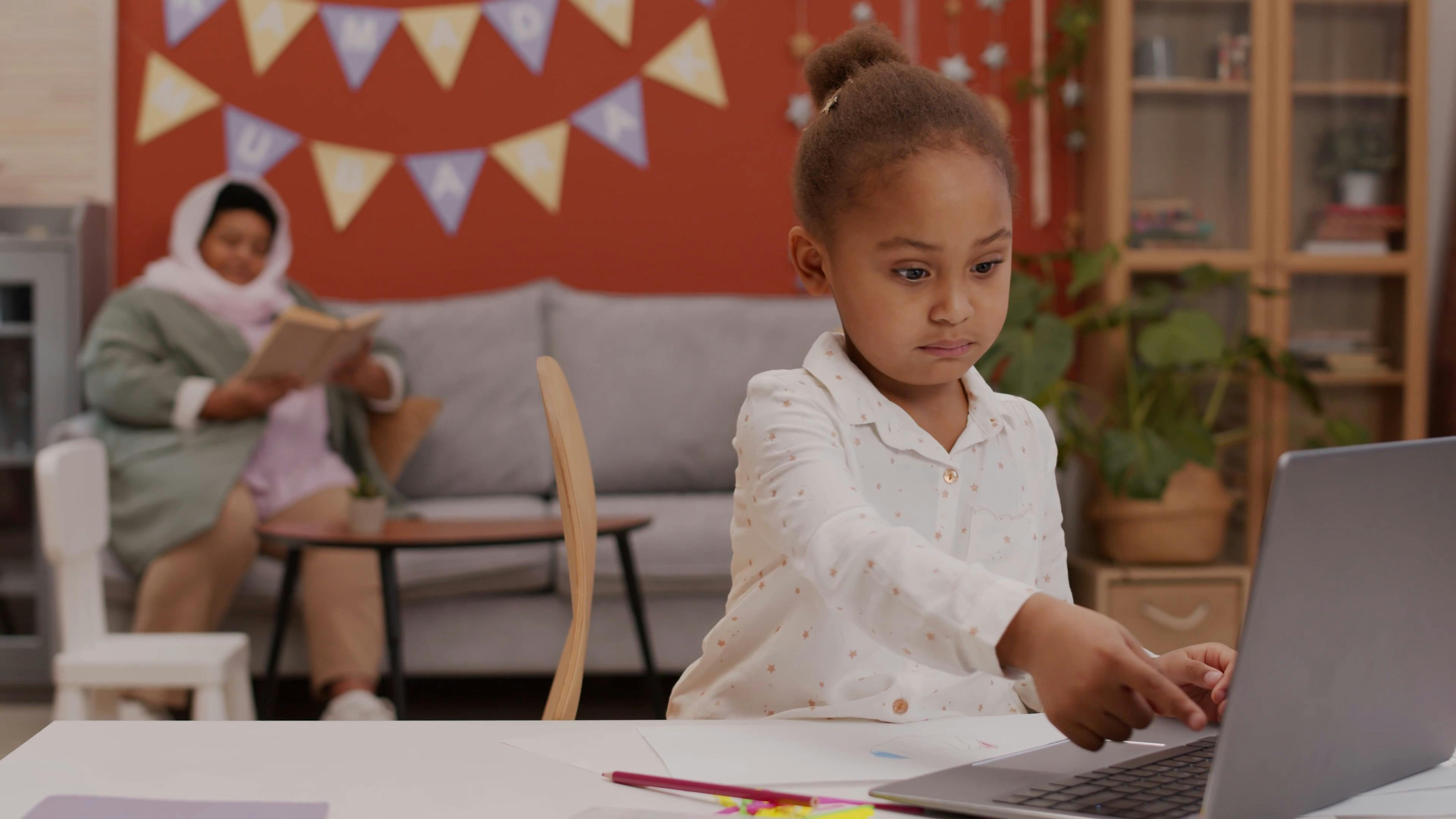 A Girl Using a Laptop · Free Stock Video
