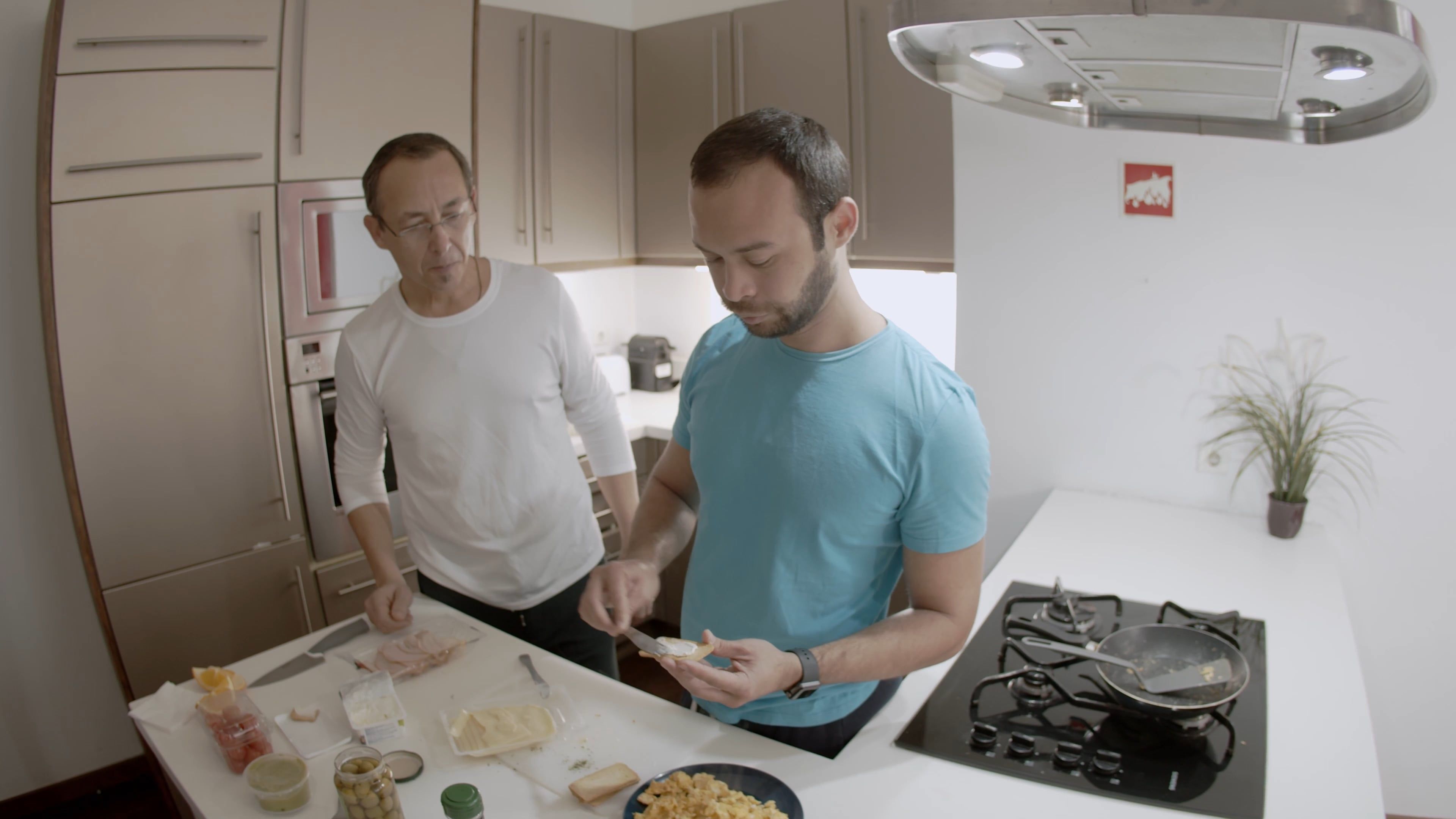 Men Preparing Breakfast in the Kitchen · Free Stock Video