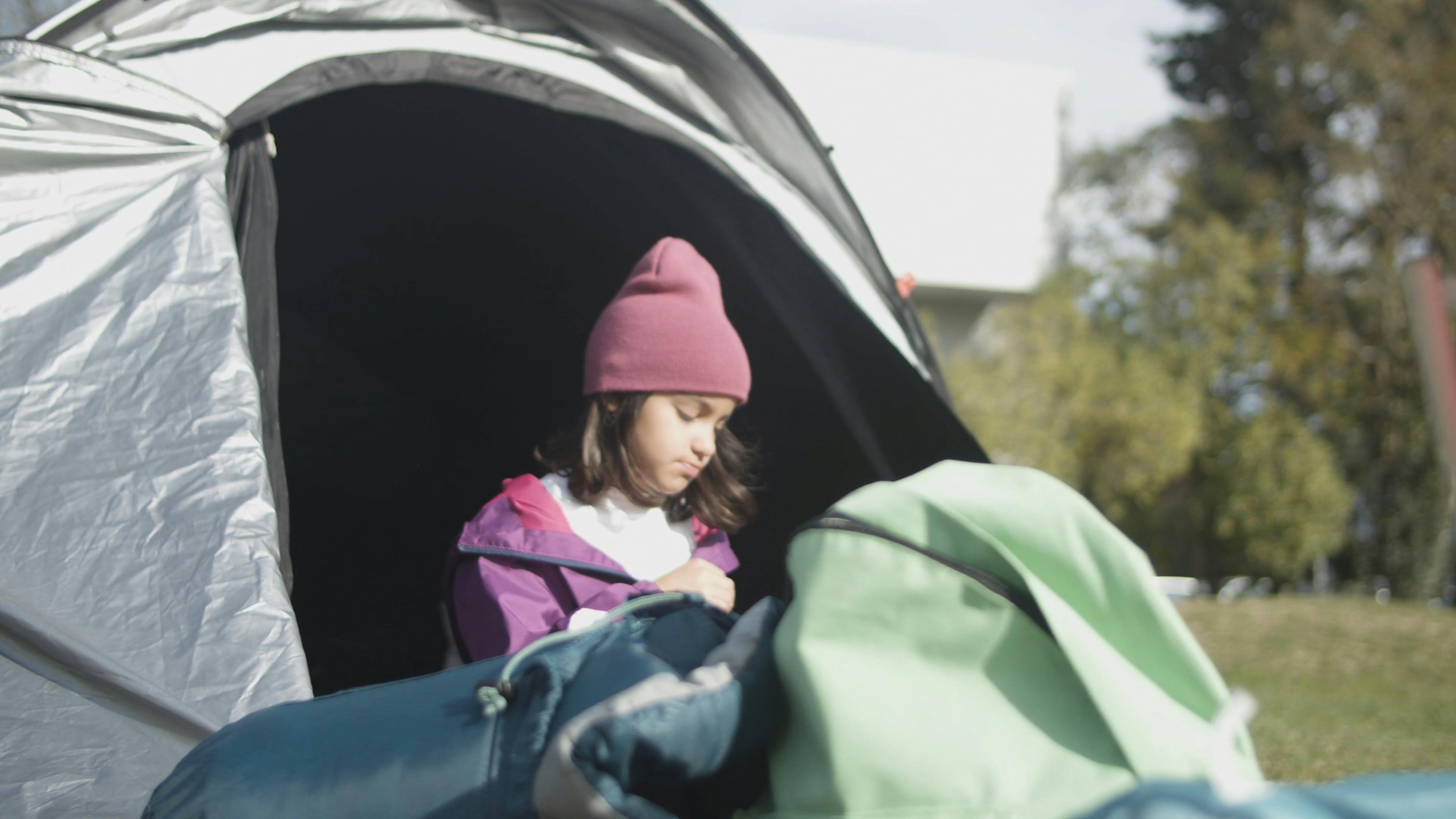 Girl Reading a Book Inside a Tent · Free Stock Video