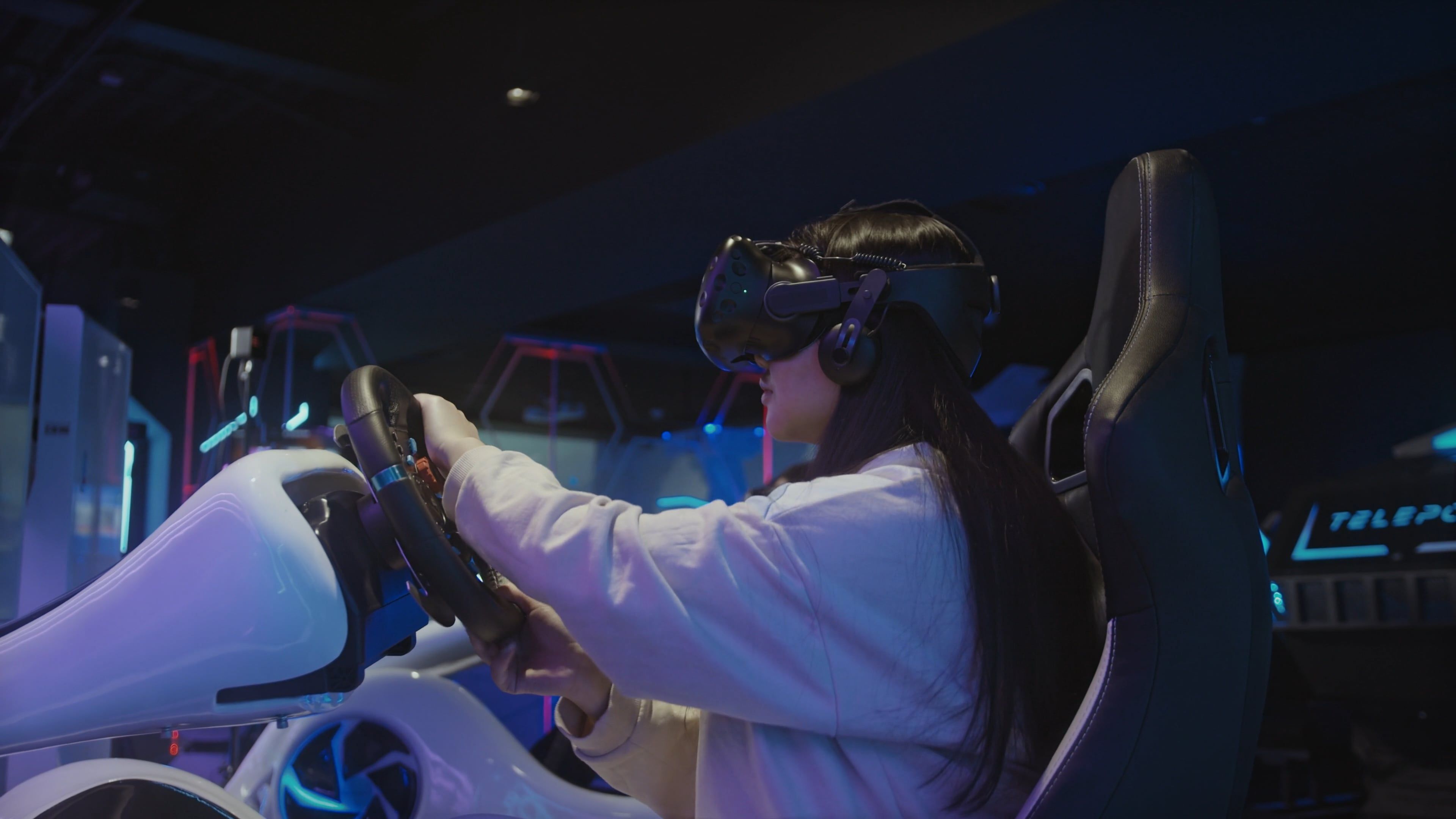 A Woman Playing Driving Simulator Free Stock Video Footage, Royalty ...