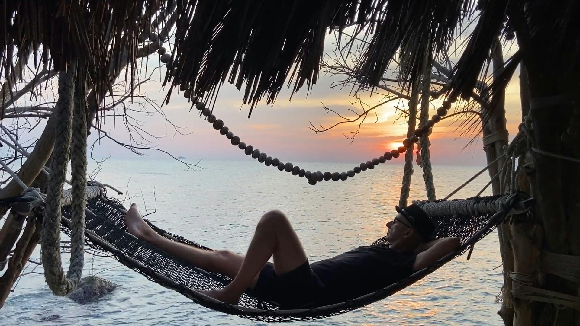 Man in a Hammock at the Beach · Free Stock Video