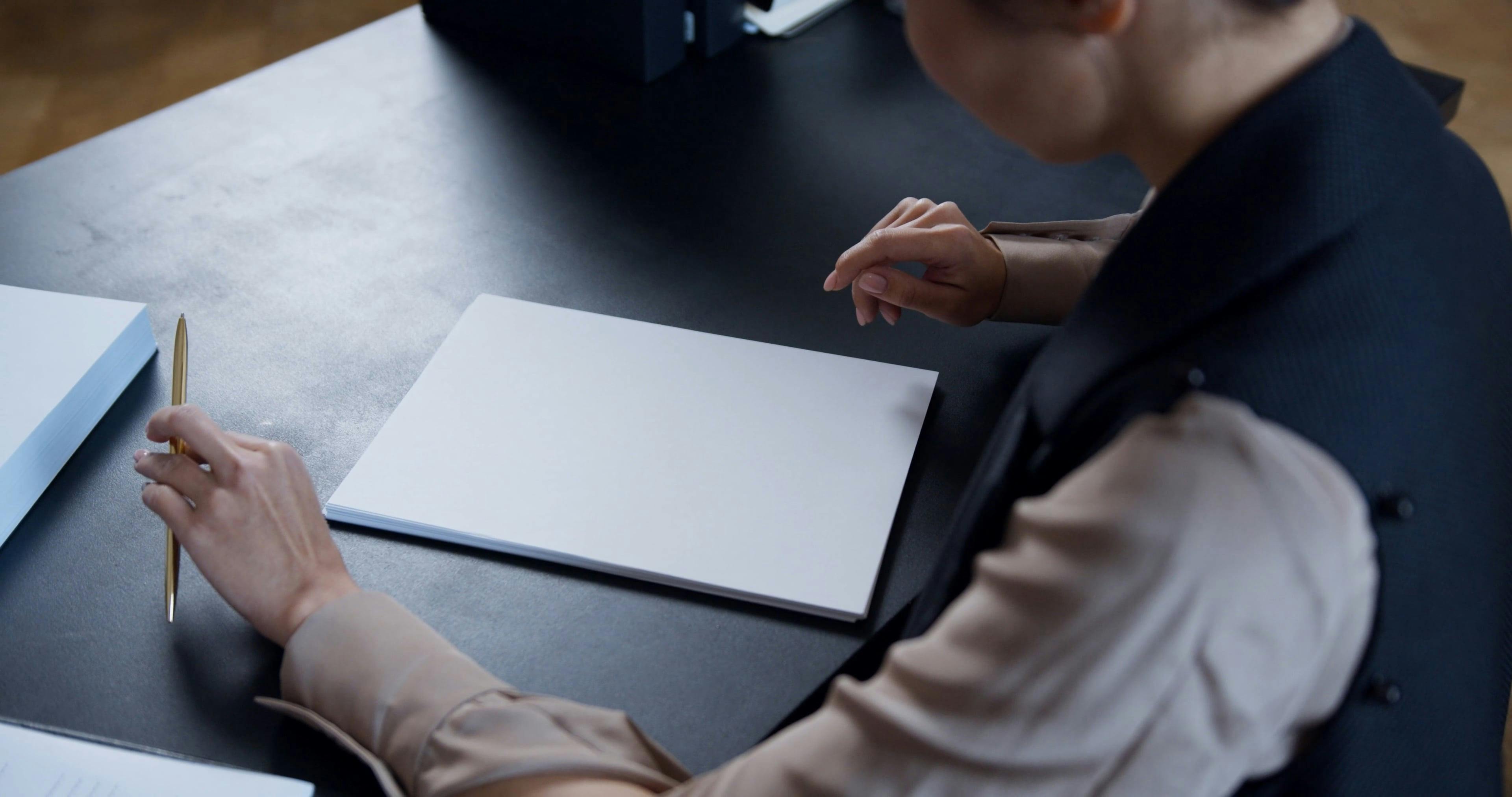 A Person Holding a Pen · Free Stock Video