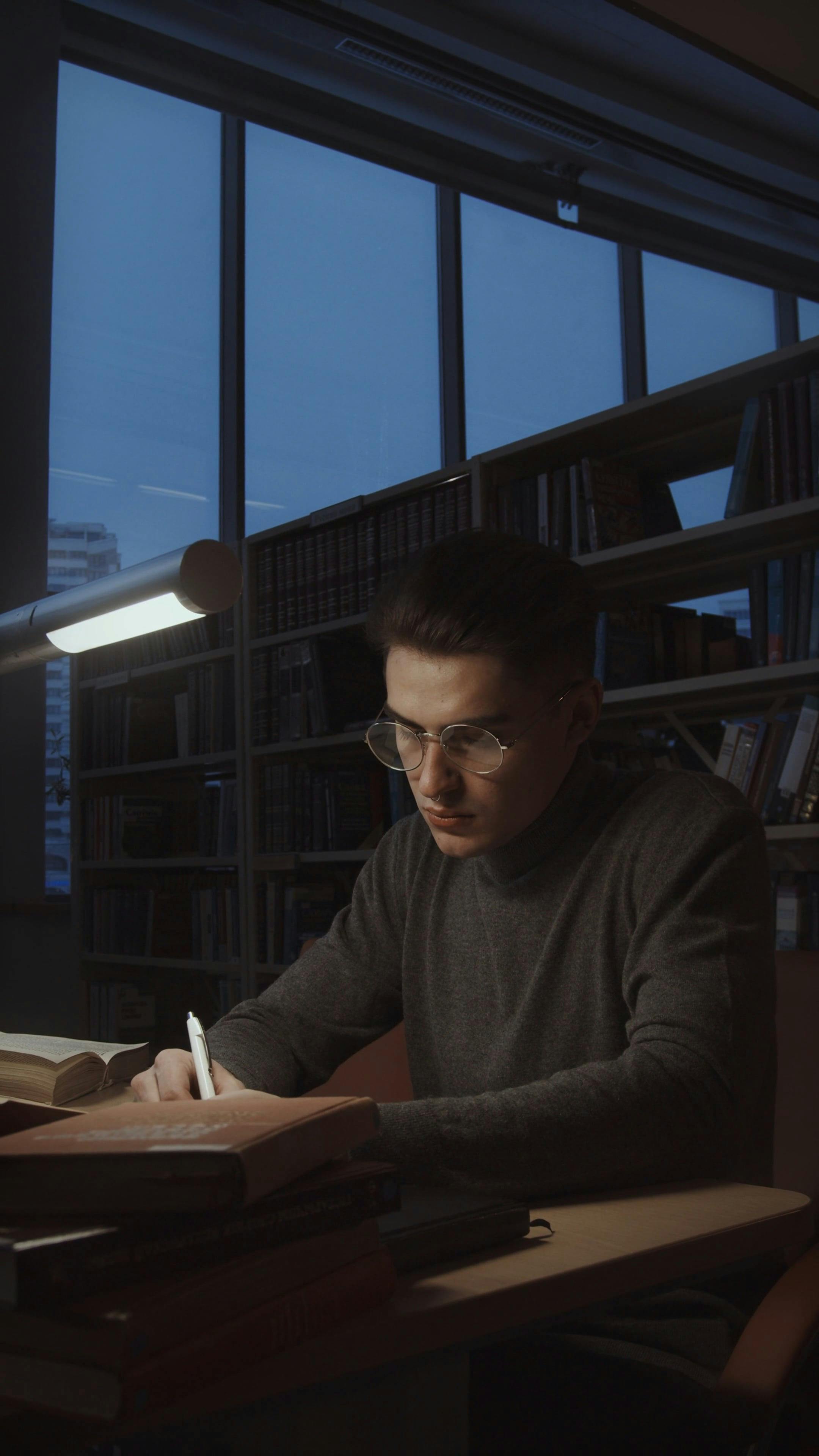 A Man Researching in a Library · Free Stock Video