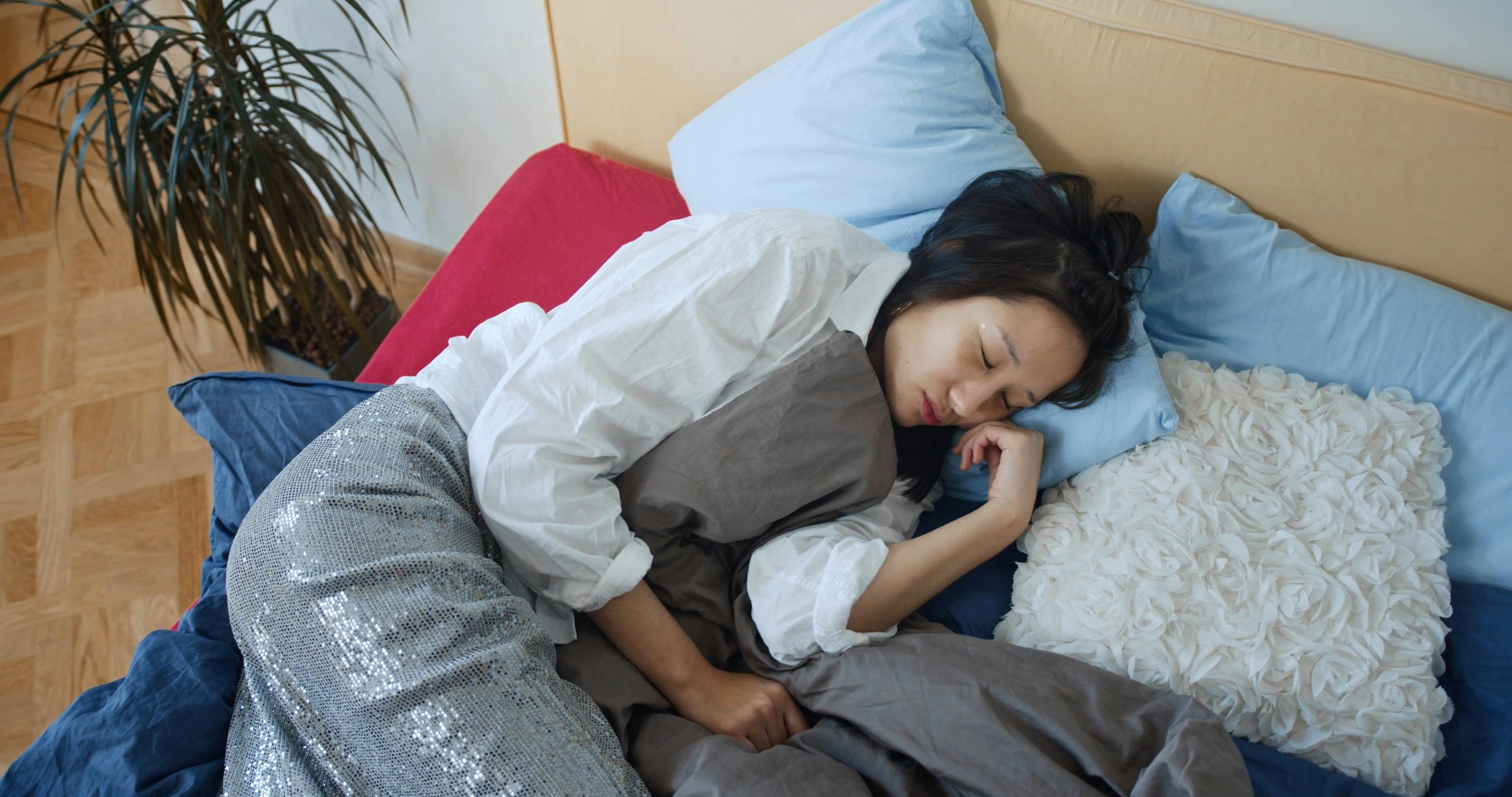 A Woman Lying Down the Bed Beside Her Friend Free Stock Video Footage ...