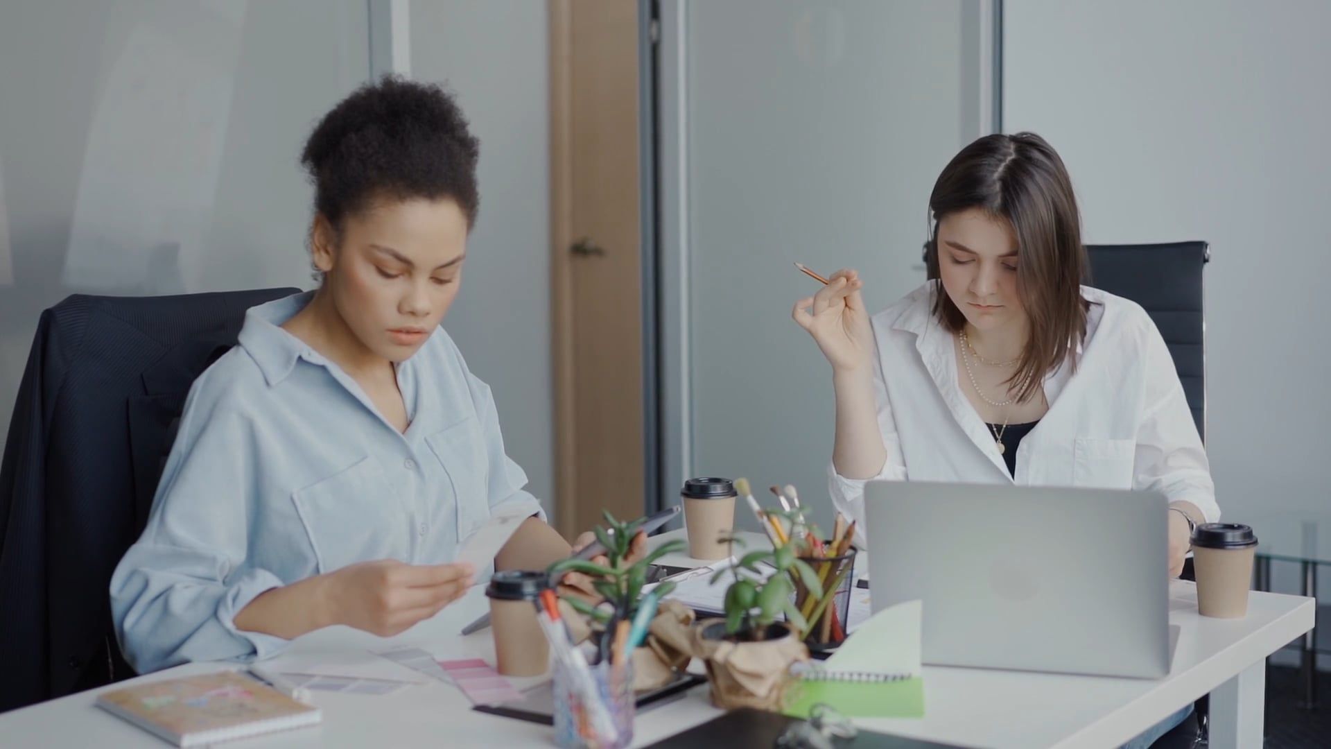 A Man Showing His Laptop to His Colleagues · Free Stock Video