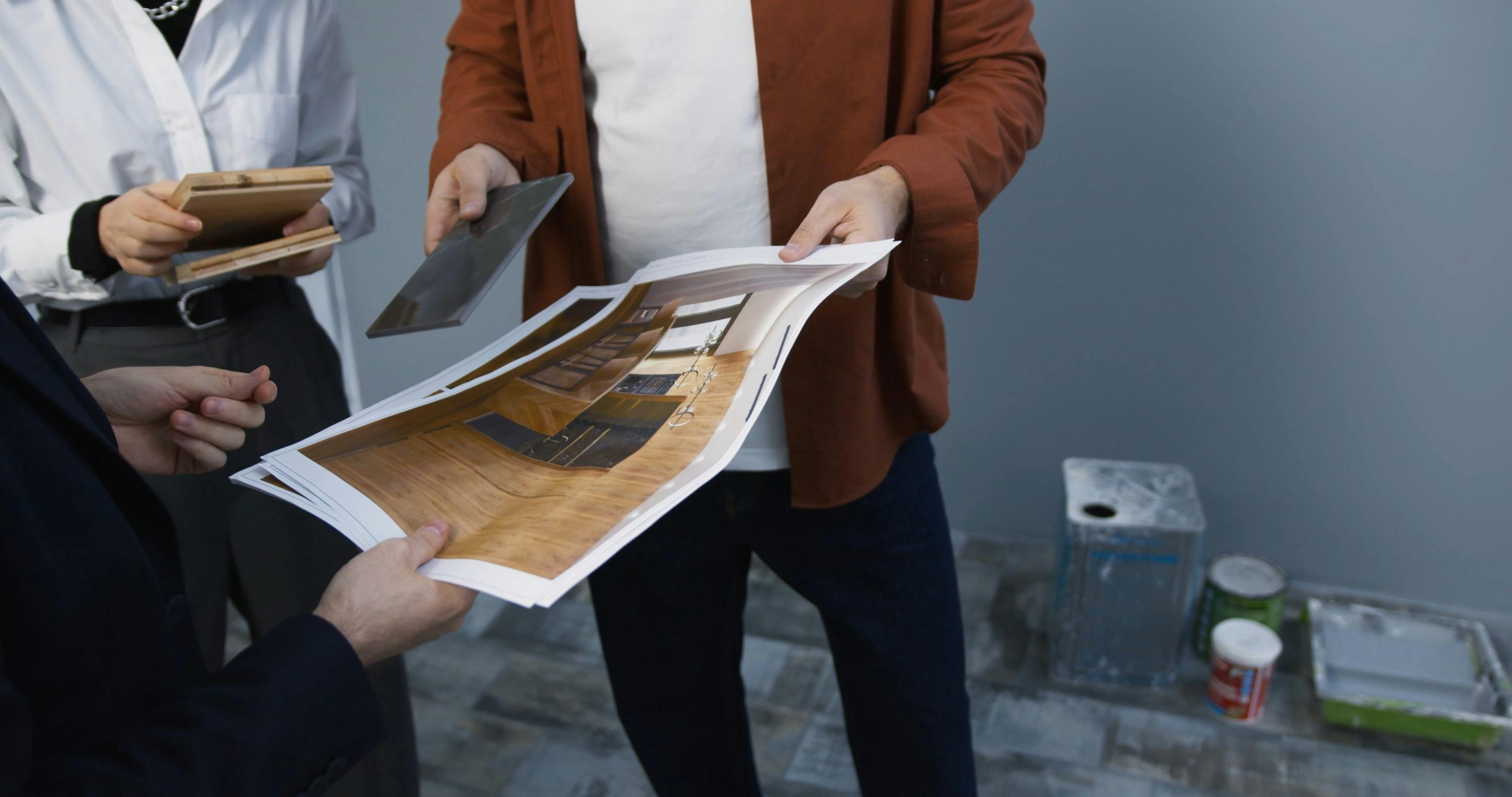 Man Presenting Tile samples to His Colleagues Free Stock Video Footage ...