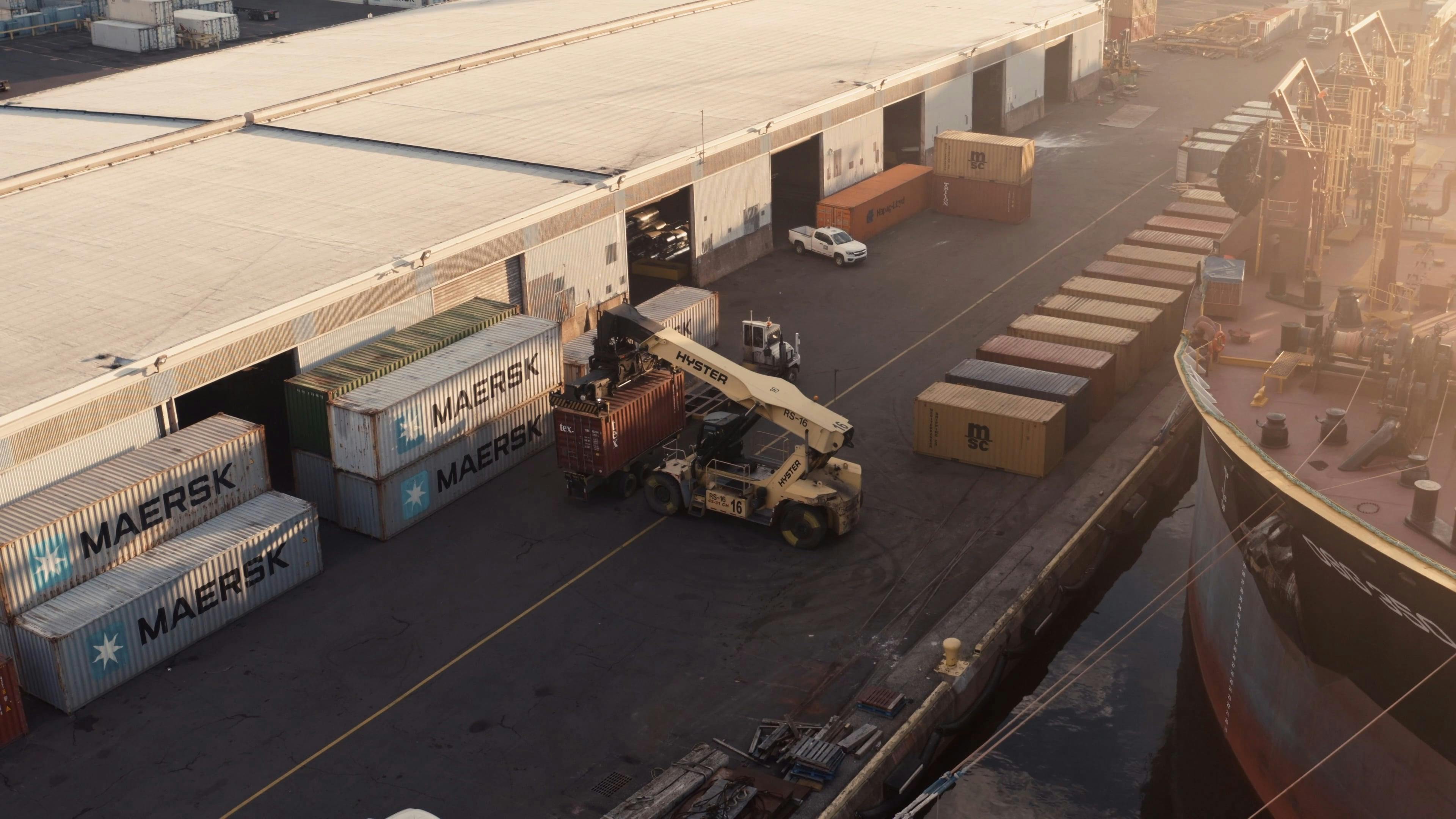 Truck Unloading a Cargo Container · Free Stock Video