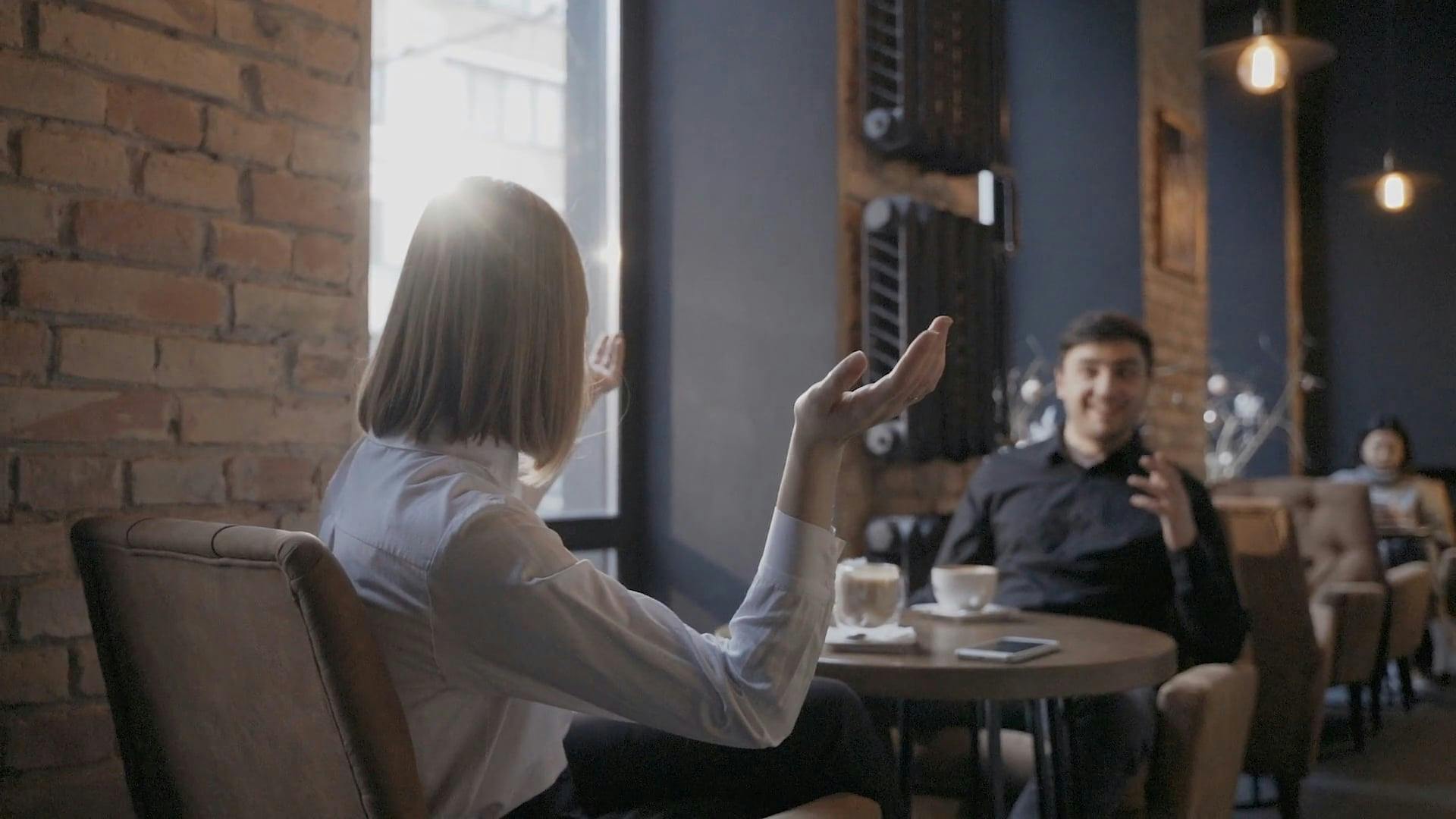 Couple Having a Conversation at the Coffee Shop Free Stock Video ...