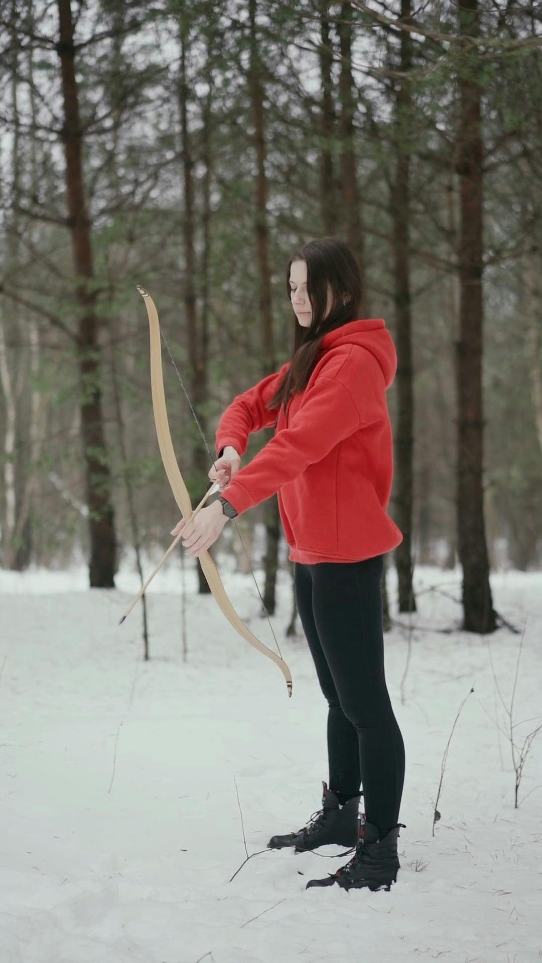 Woman Doing Archery in the Snow Free Stock Video Footage, Royalty-Free ...