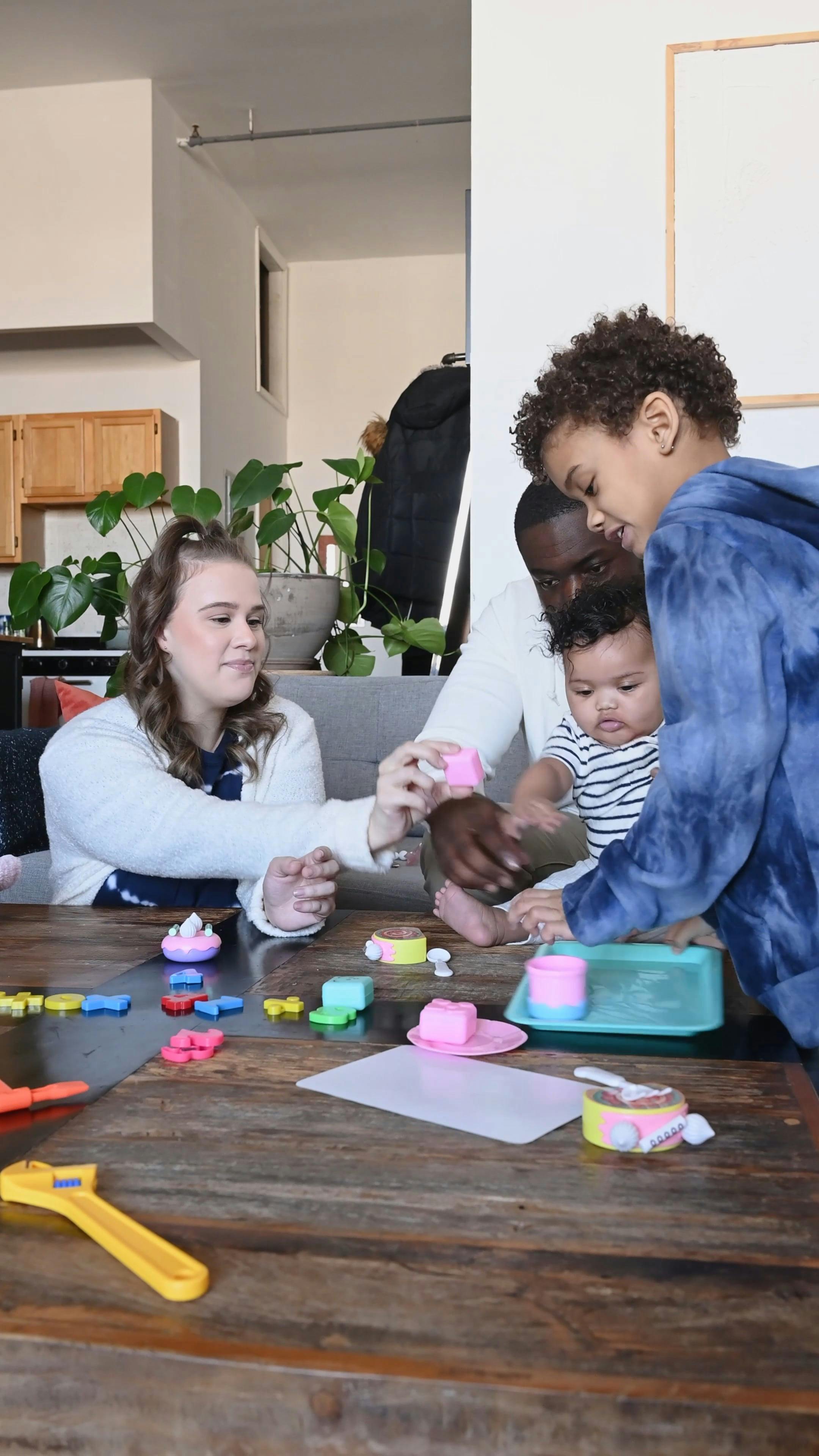 Parents and Children Playing Toys · Free Stock Video