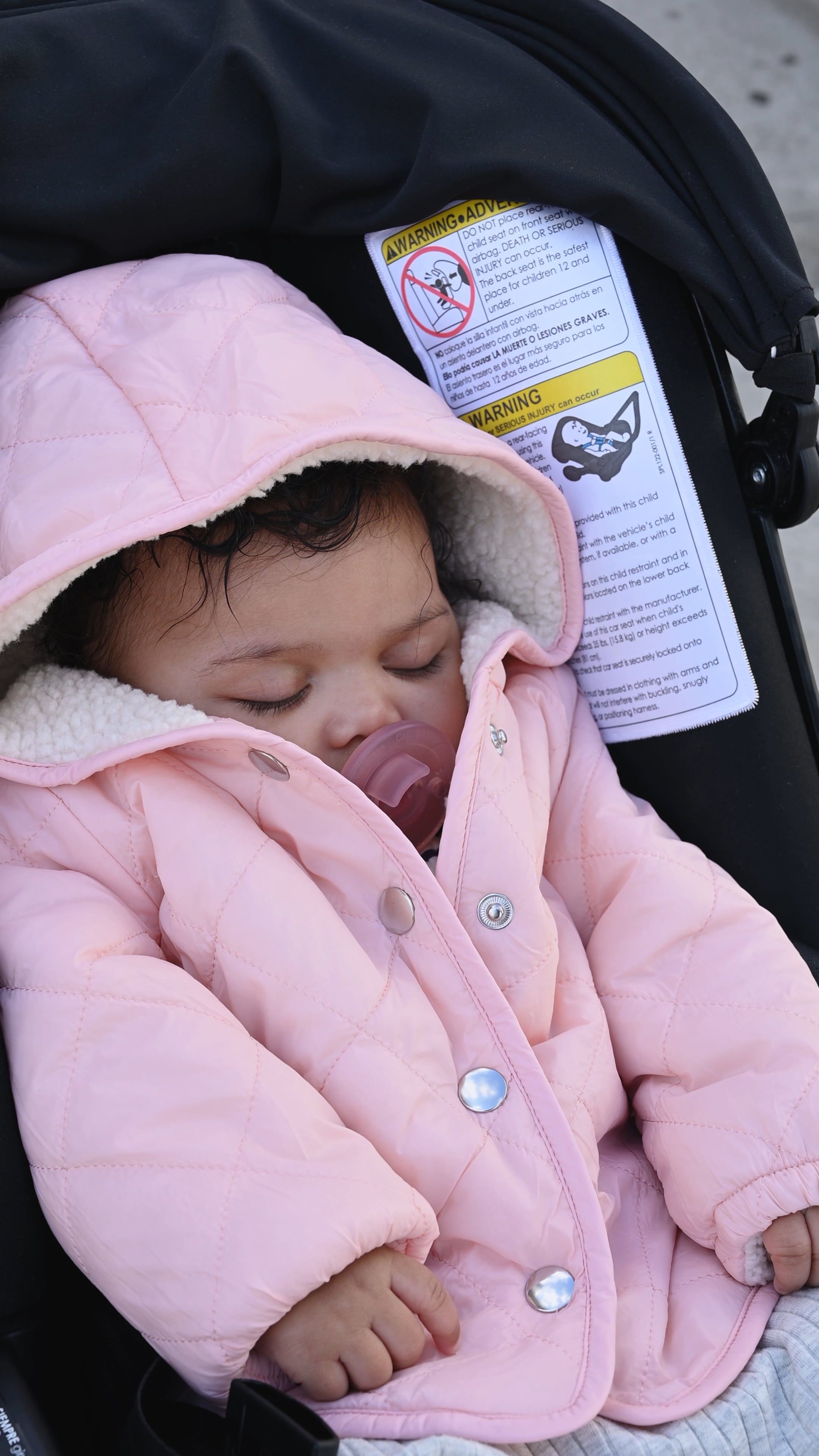 Baby with Pacifier Sleeping in a Stroller · Free Stock Video