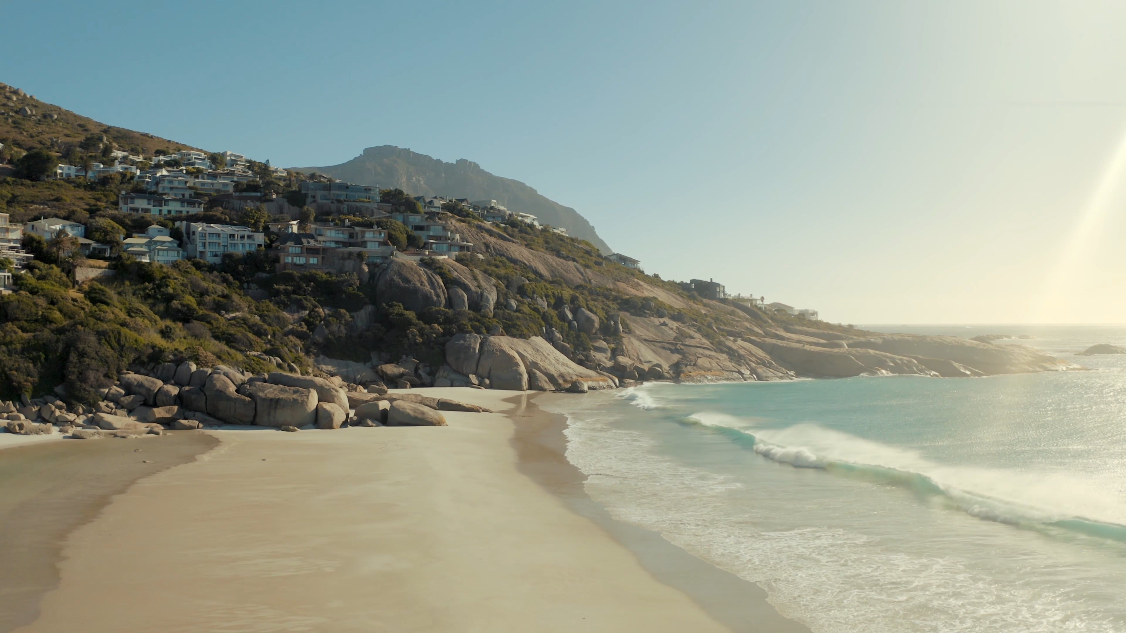 Aerial Footage of a Beach and Mountain · Free Stock Video