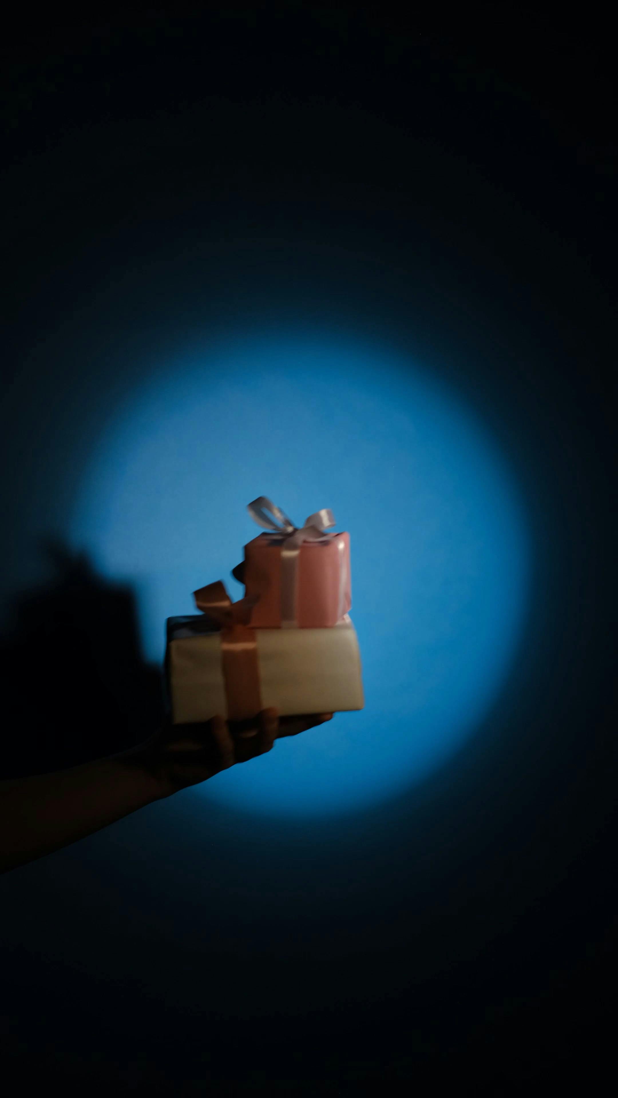 Person Giving Someone A Present On The Spotlight Free Stock Video ...