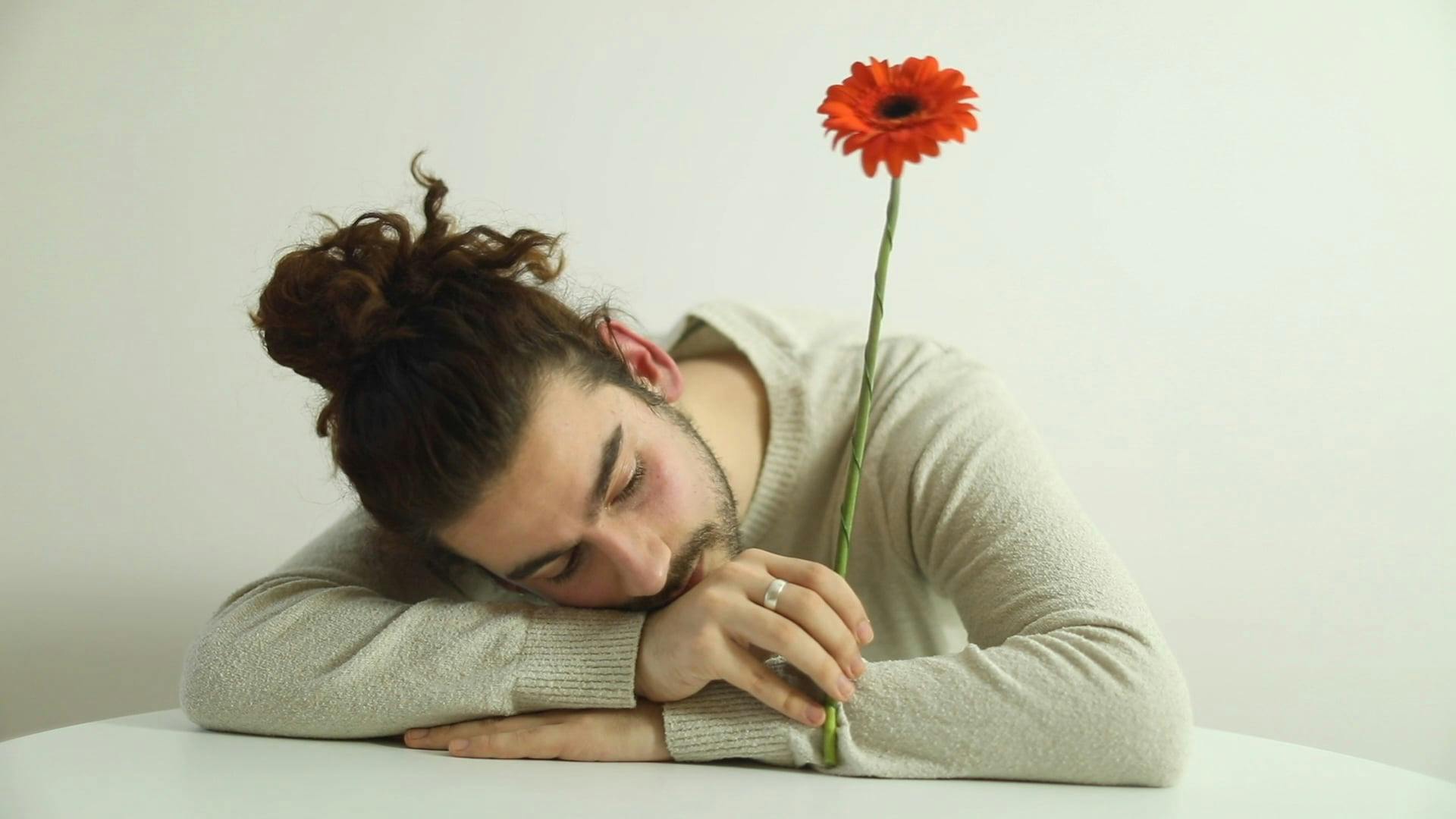 Man Holding Flower · Free Stock Video