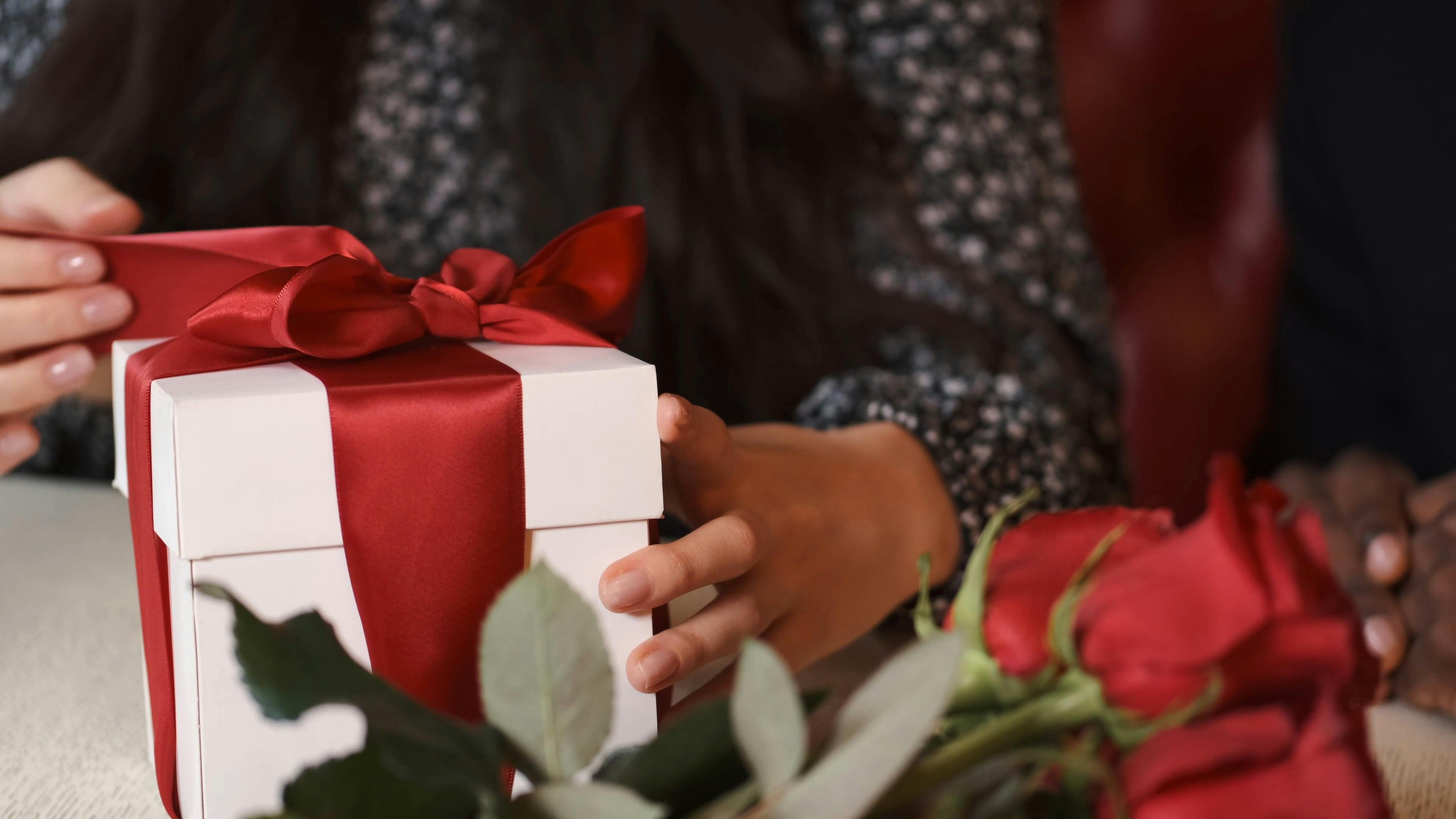 A Woman Opening a Present Free Stock Video Footage, Royalty-Free 4K ...