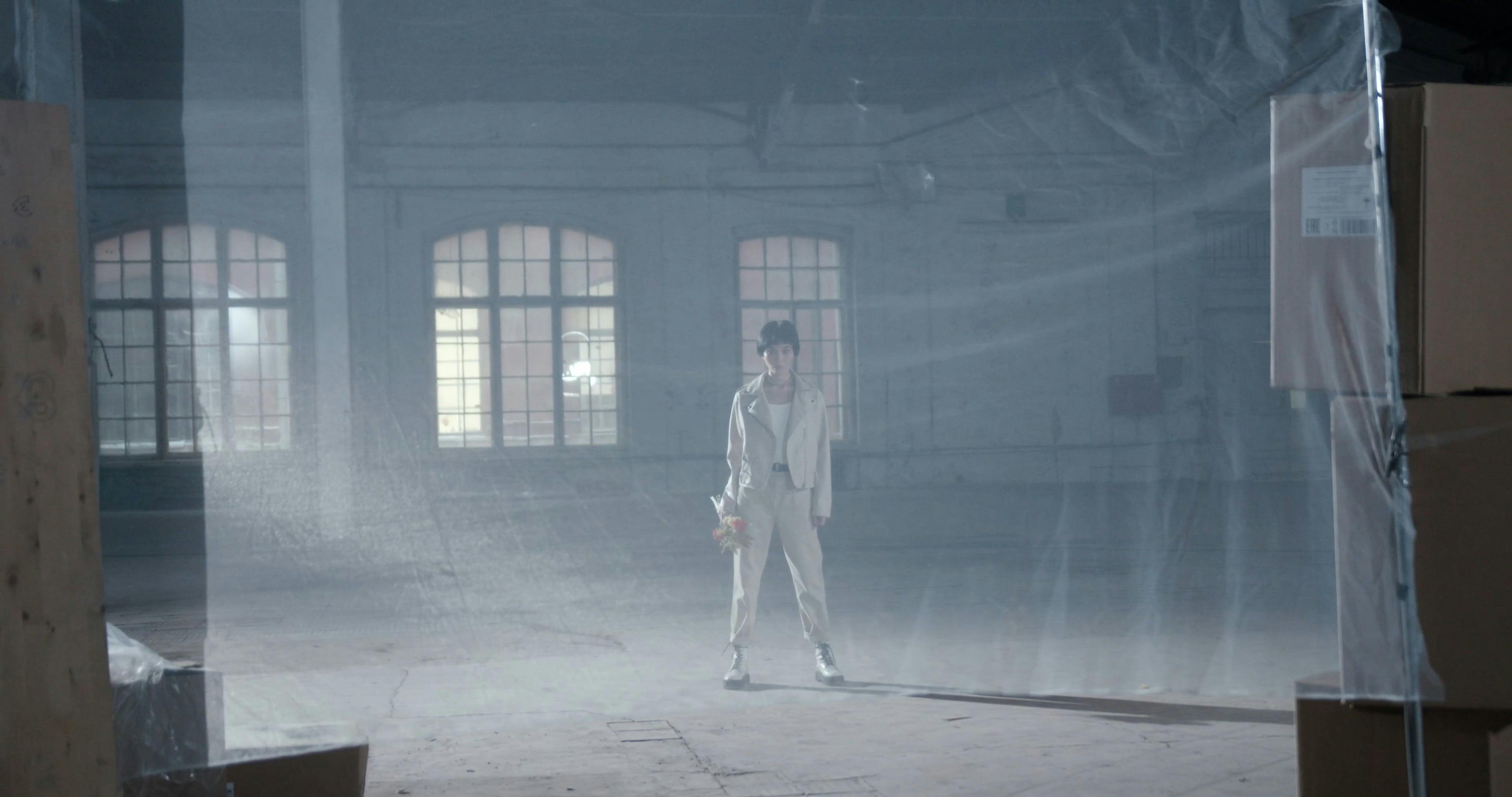 A Woman Throwing a Bouquet of Flowers on Sheer Fabric Free Stock Video ...