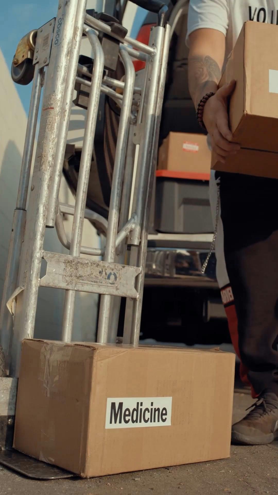 A Person Putting Down a Box Free Stock Video Footage, Royalty-Free 4K ...