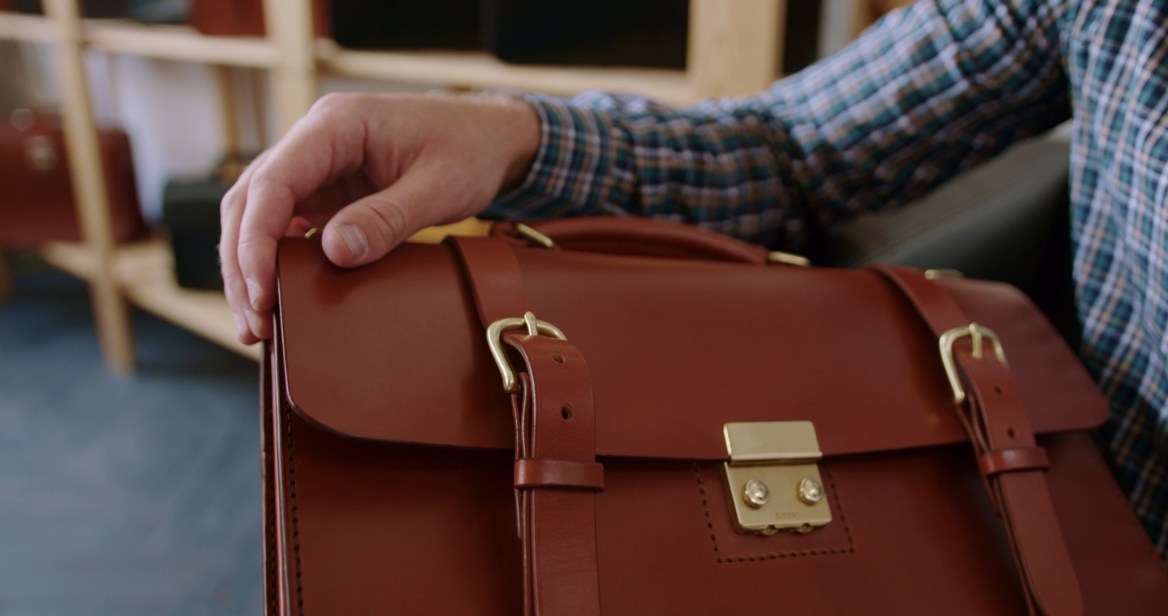 Man Showcasing a Bag to Woman · Free Stock Video