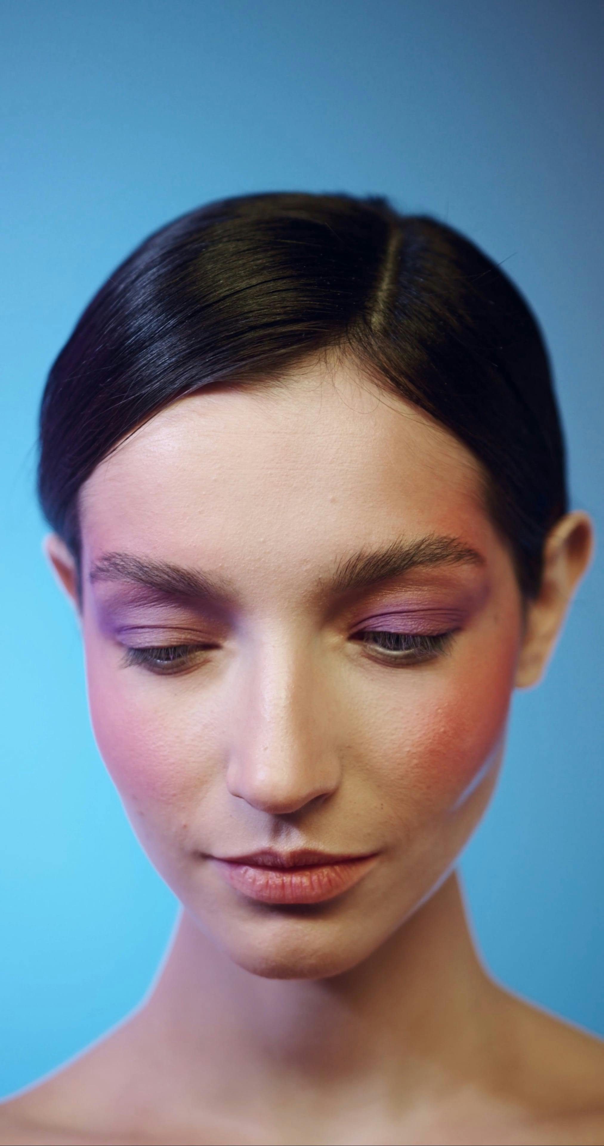 A Makeup Artist Applying Makeup On A Model Free Stock Video Footage ...
