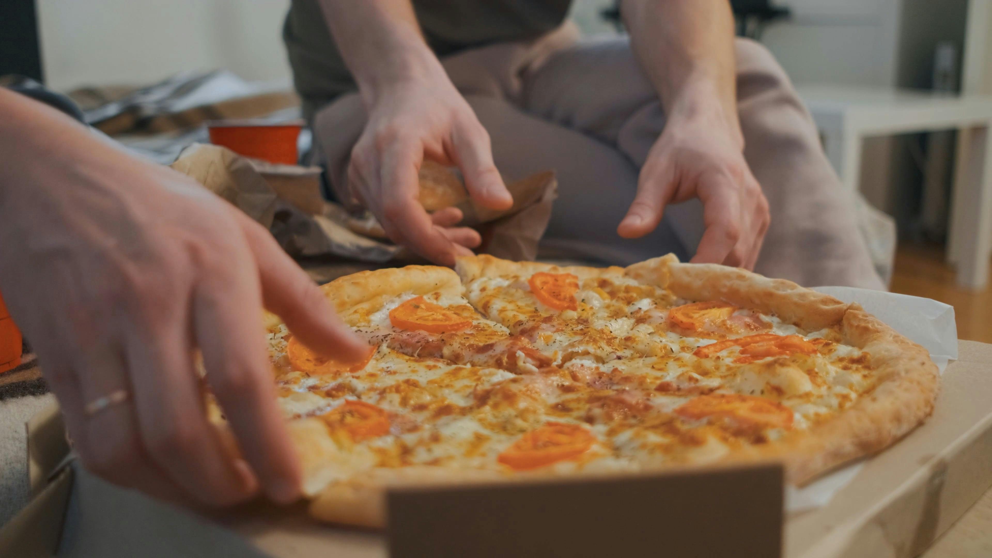 Friends Grabbing Pizza Slices Free Stock Video Footage, Royalty-Free 4K ...