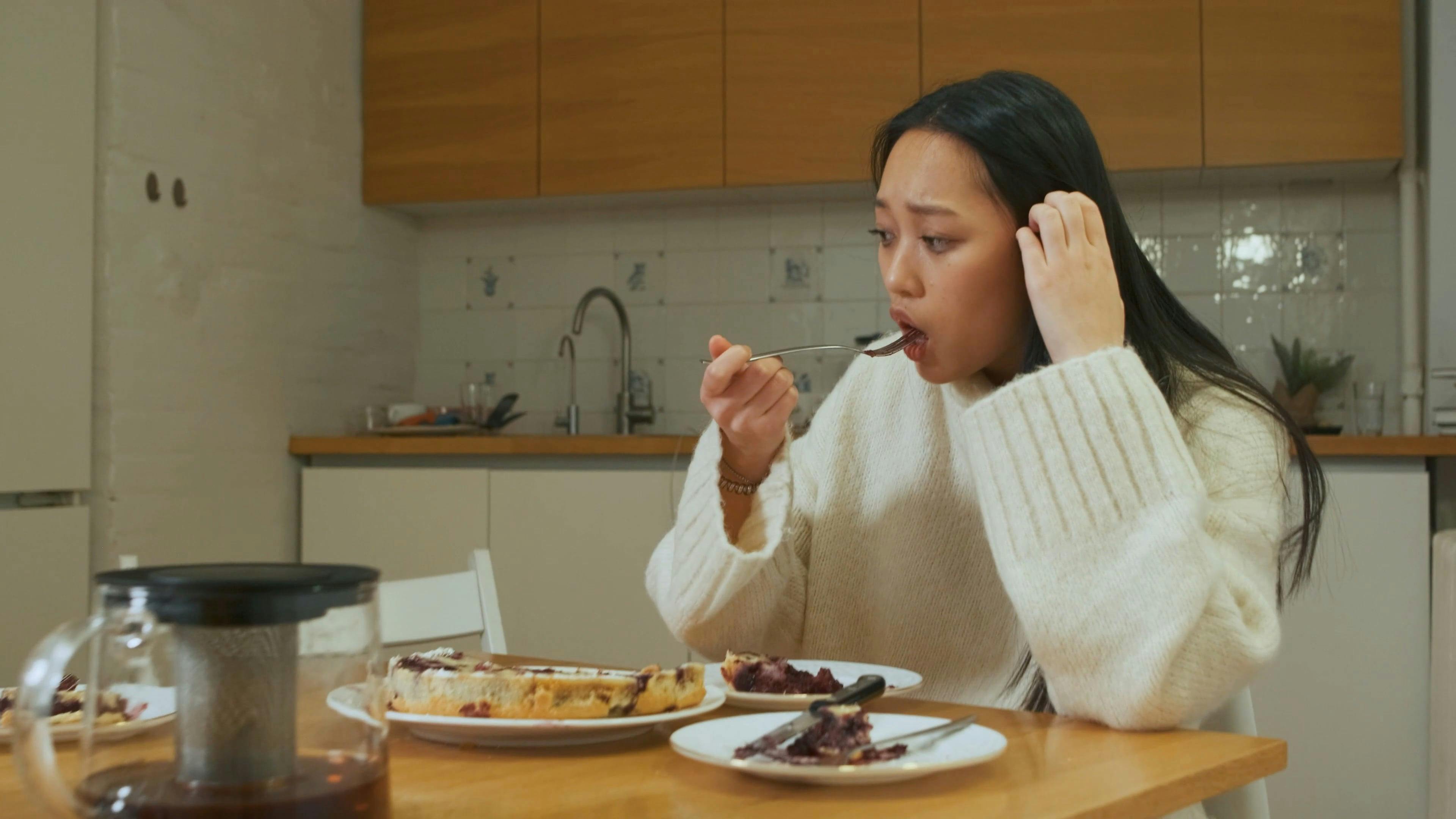 A Worried Woman Eating Alone Free Stock Video Footage, Royalty-Free 4K ...